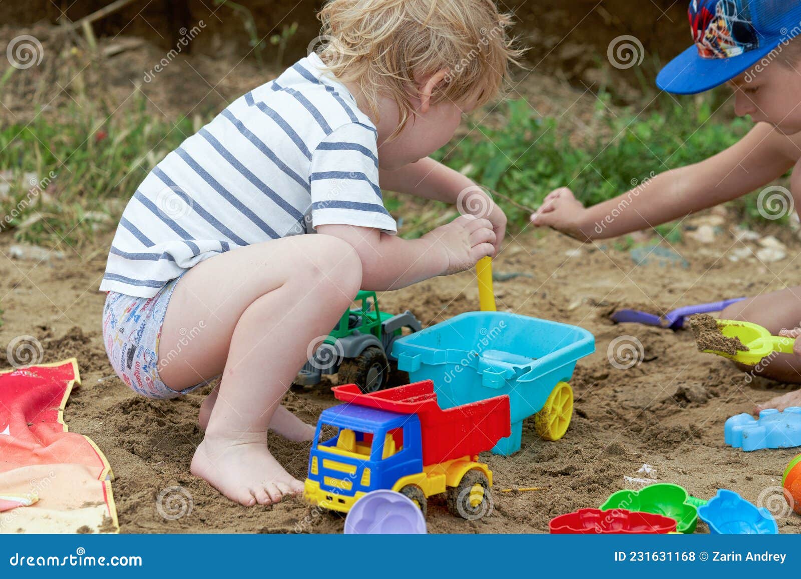 Two Children Play in the Sand with Plastic Toys Stock Photo - Image of ...