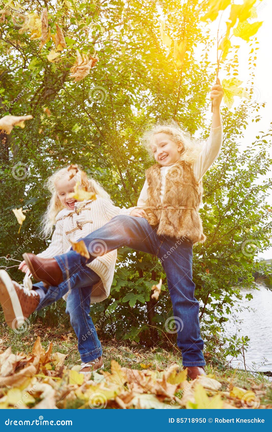 Two Children Playing and Dancing in Autumn Stock Photo - Image of ...
