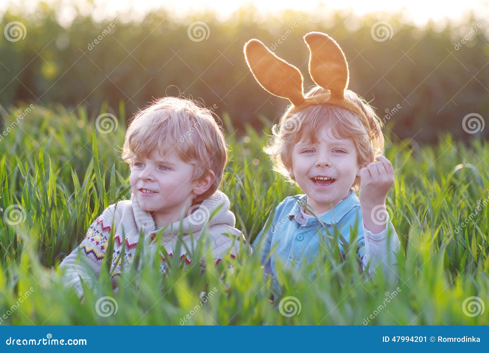 Two Children Playing with Easter Bunny Ears Stock Image - Image of ...