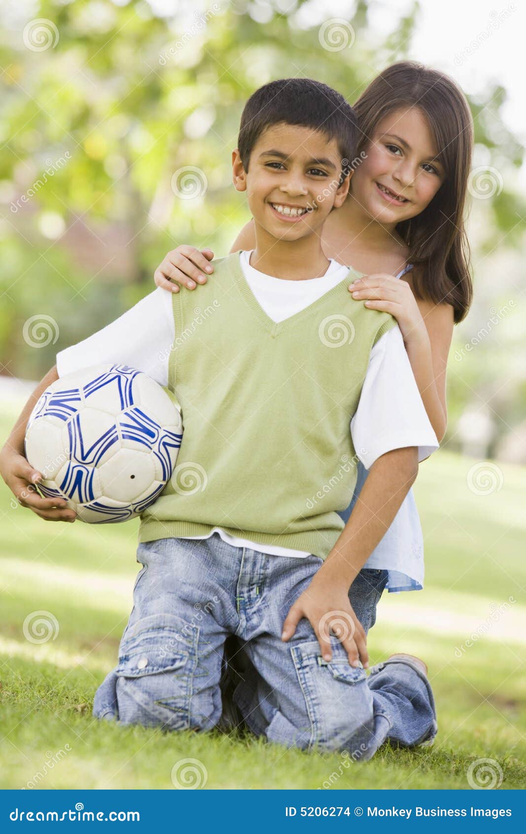 Two Children Playing in Park Together Stock Photo - Image of male ...