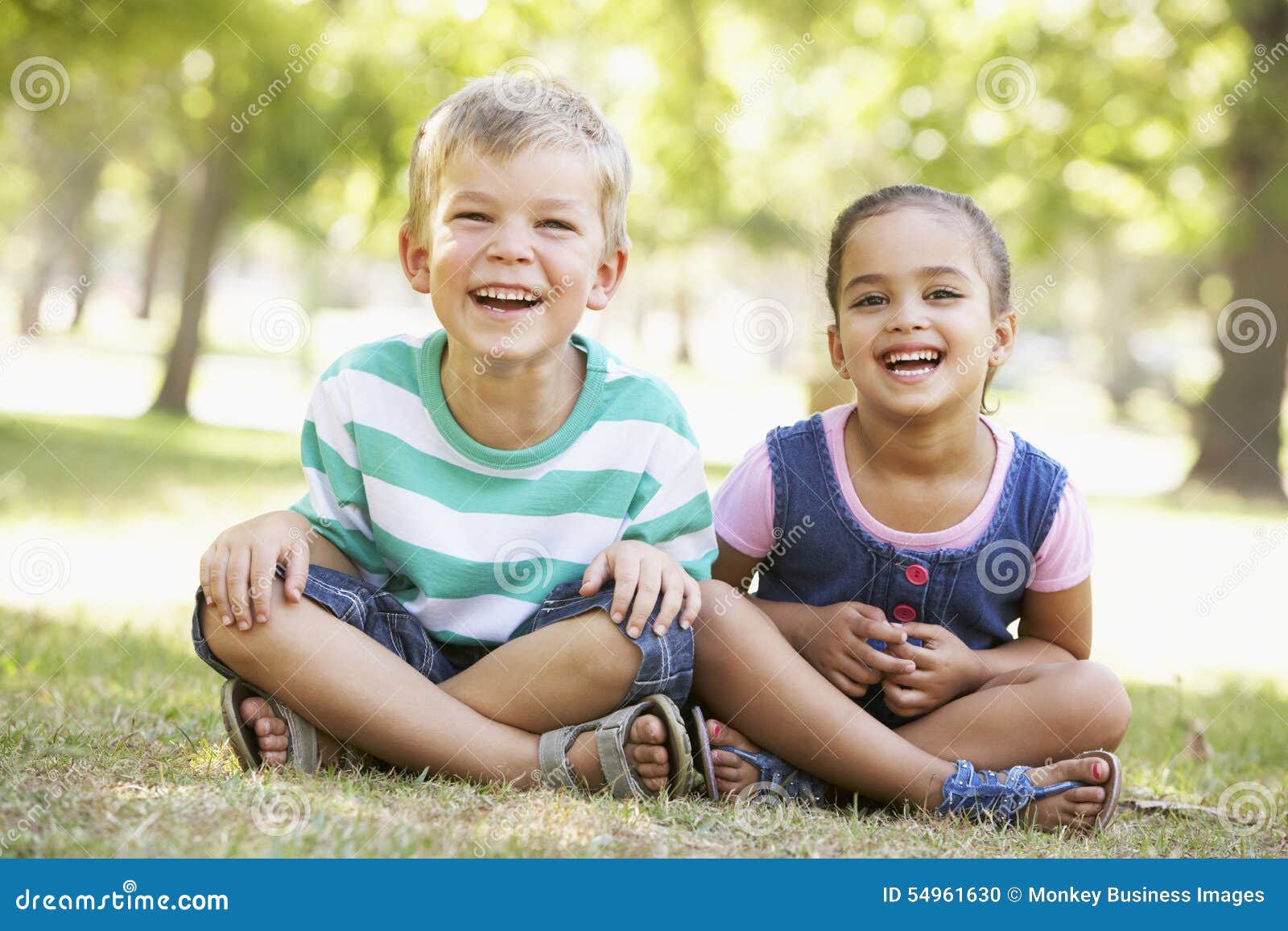 Two Children Playing Together in Park Stock Photo - Image of game ...