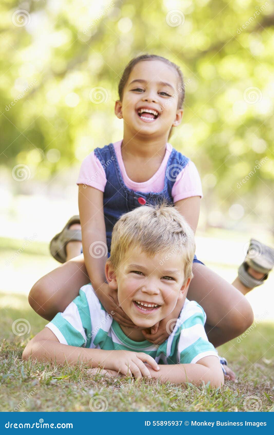 Two Children Playing Together in Park Stock Image - Image of five, park ...