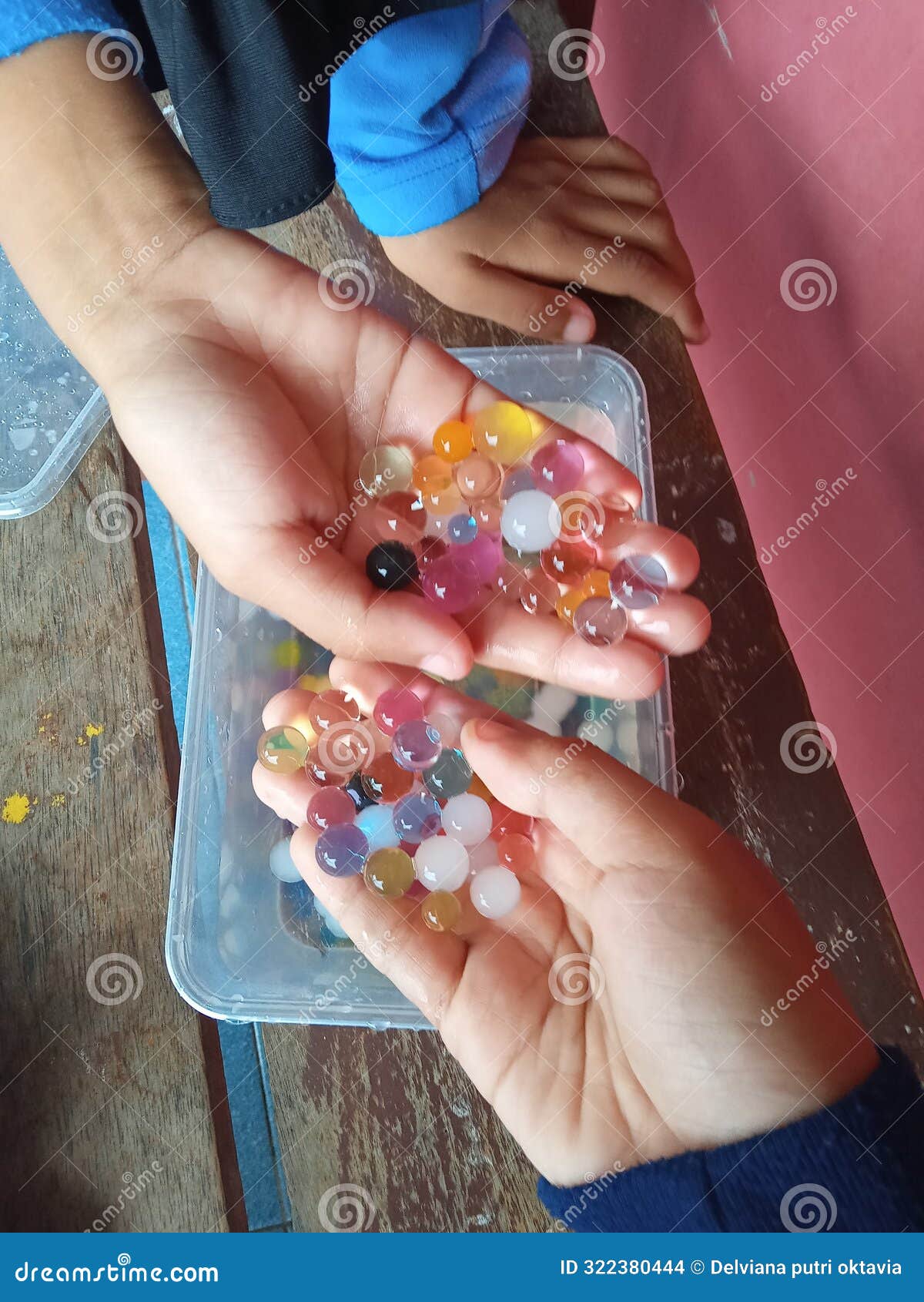 Two Children Playing Water Ball on a Board Stock Photo - Image of water ...