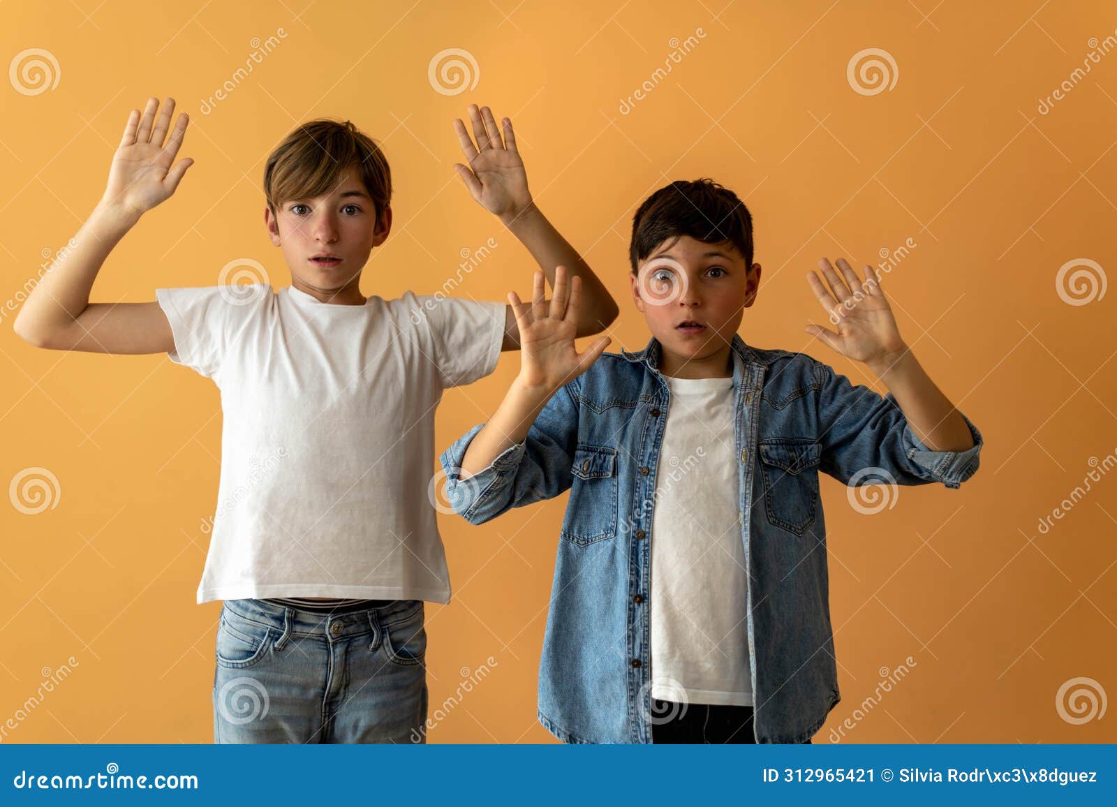 Two Children with Raised Hands and Scared Face Stock Image - Image of ...