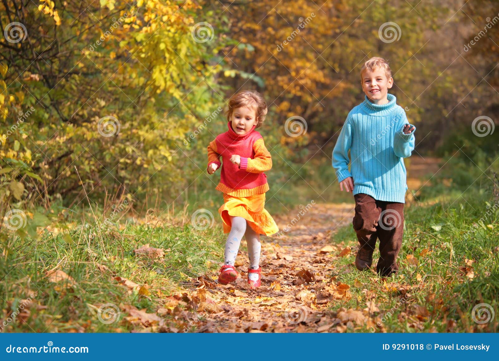 Two Children Run on Wood Autumn Footpath Stock Photo - Image of autumn ...