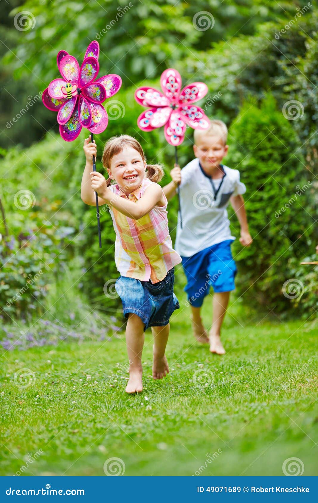 Two Children Running in Garden in Summer Stock Image - Image of outside ...