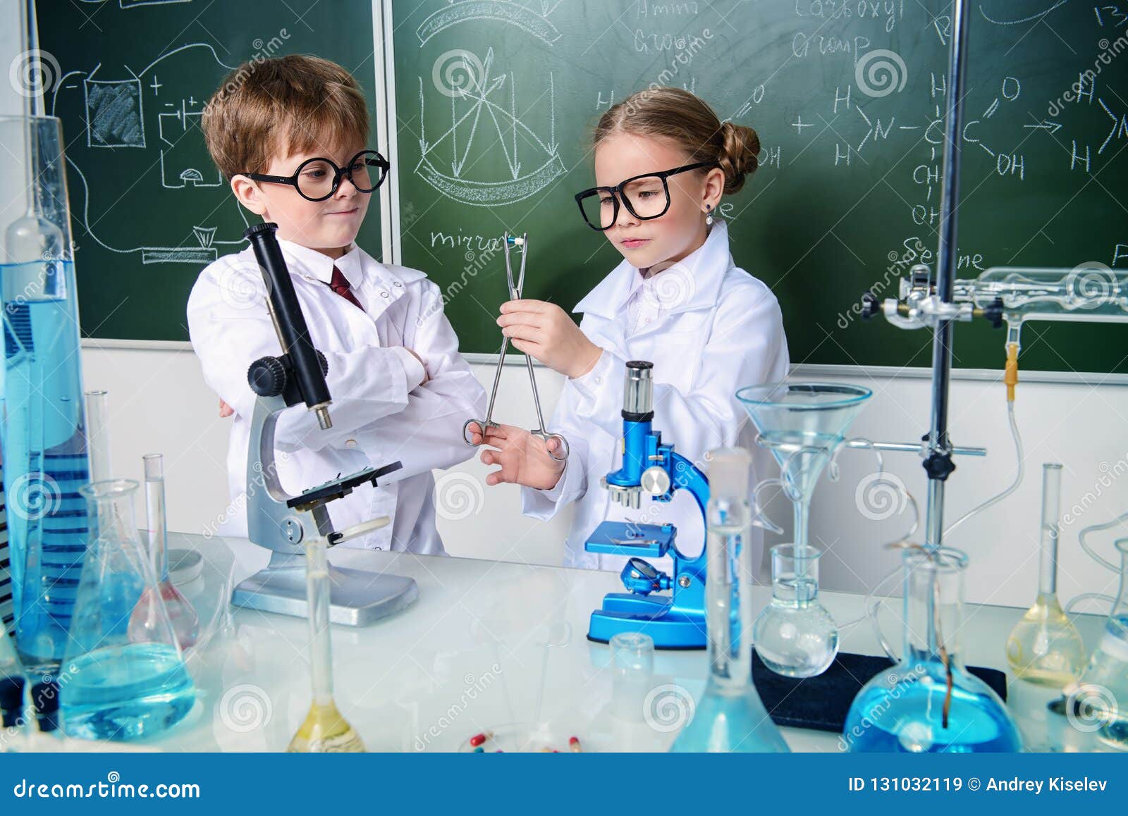 Two children scientists stock image. Image of childhood - 131032119