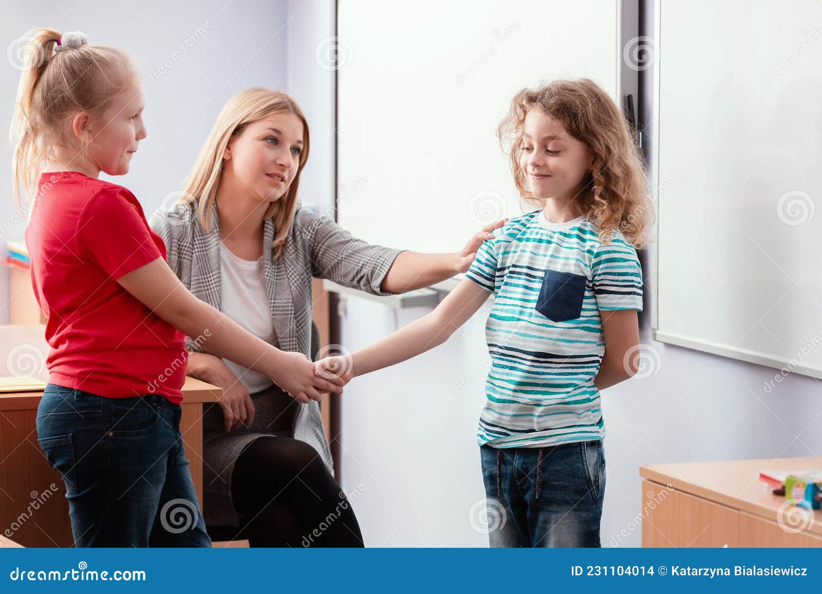 Children Shake Hands in Agreement during Class Stock Photo - Image of ...