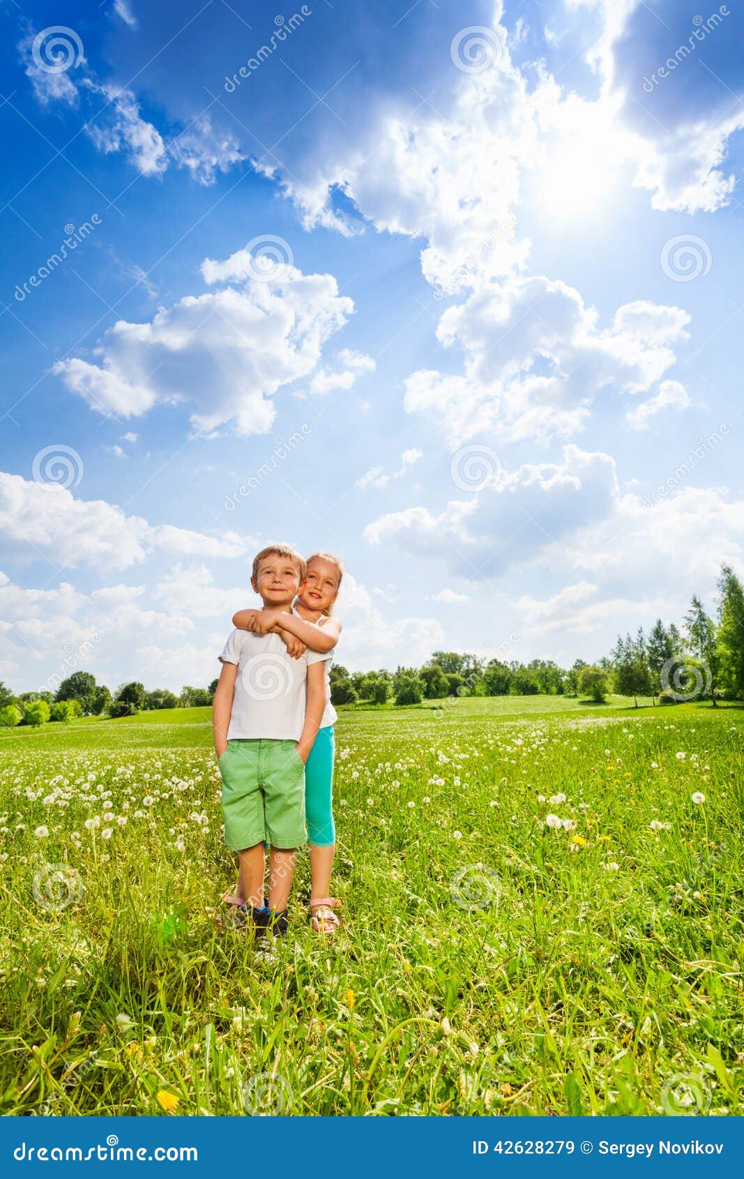 Two Children Stand Together on a Meadow Stock Image - Image of outdoors ...