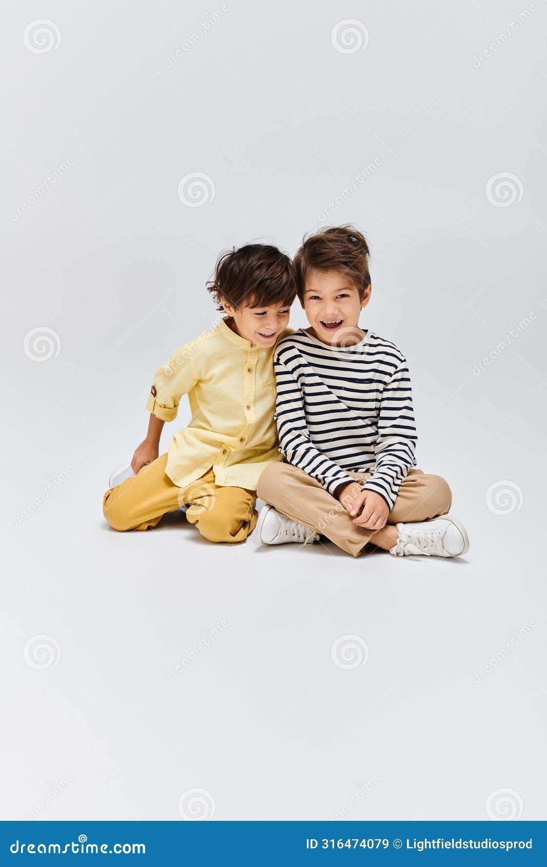 Two Children in a Studio Setting Stock Image - Image of posing ...