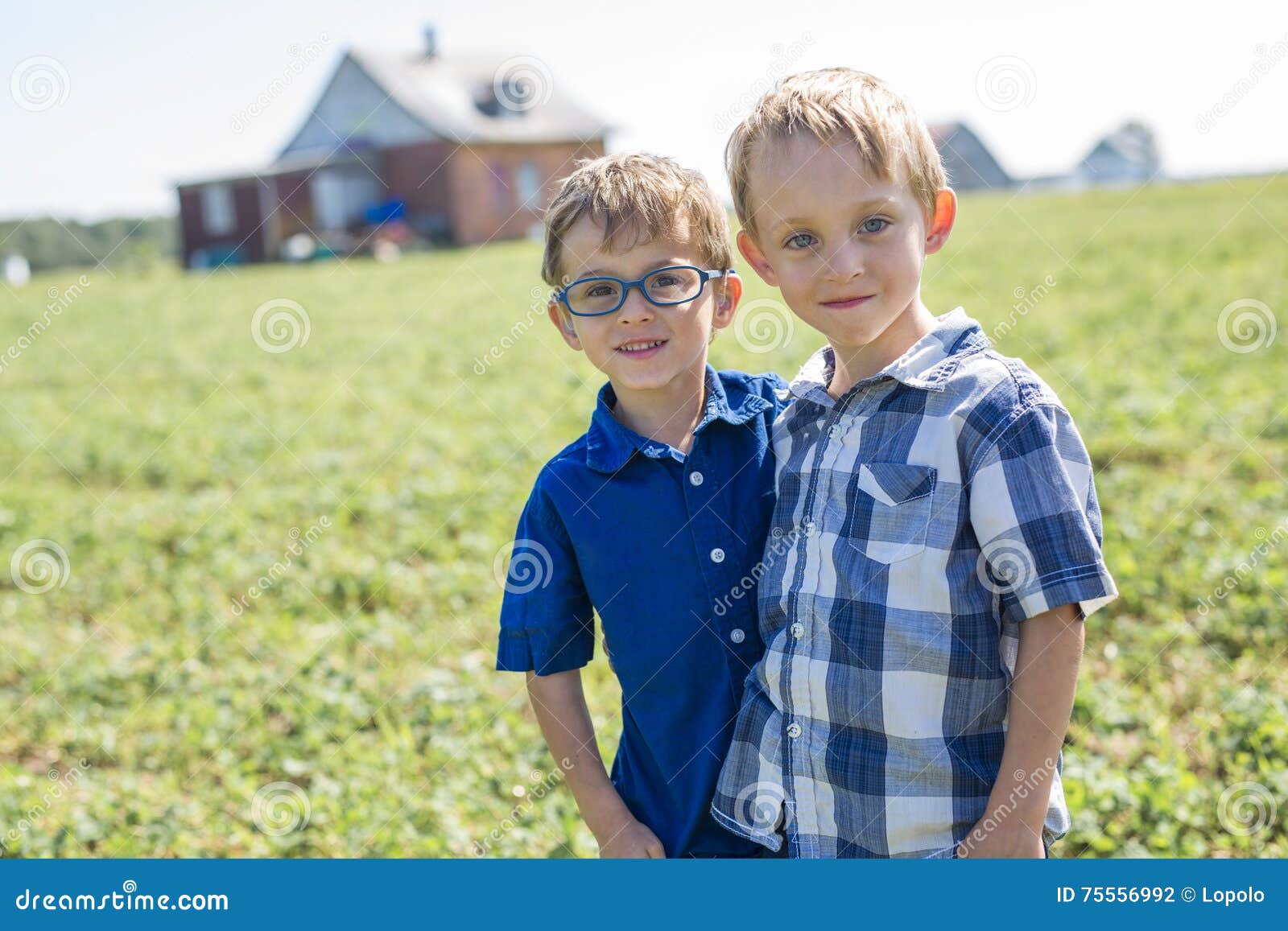 Two Children Together in Field Stock Photo - Image of male, laughing ...