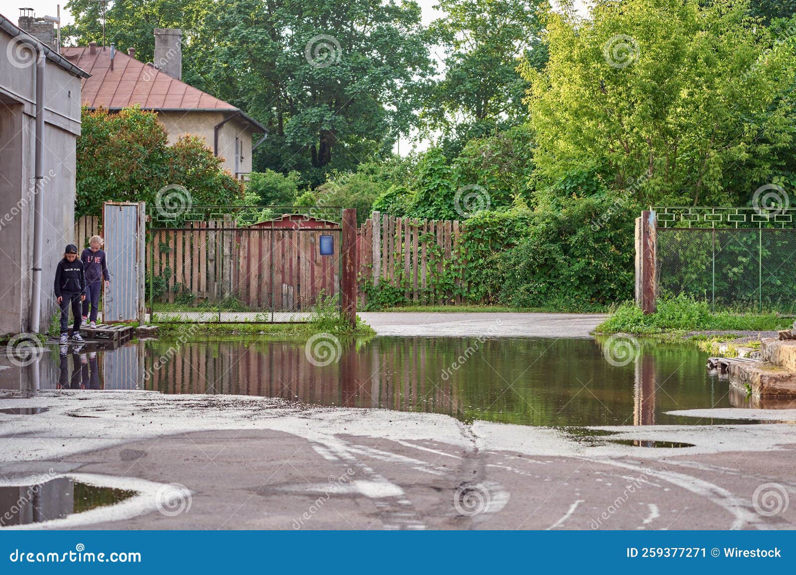 A Huge Puddle In Front Of The Gate On The Football Field. Unfinished ...