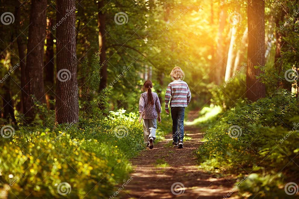 Two Children are Walking Along the Path Stock Image - Image of rest ...