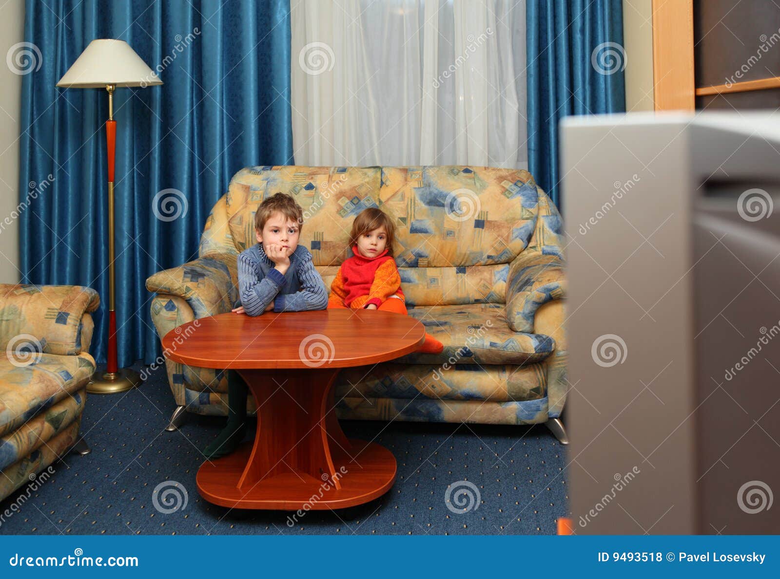 Two children watch tv stock photo. Image of illumination - 9493518