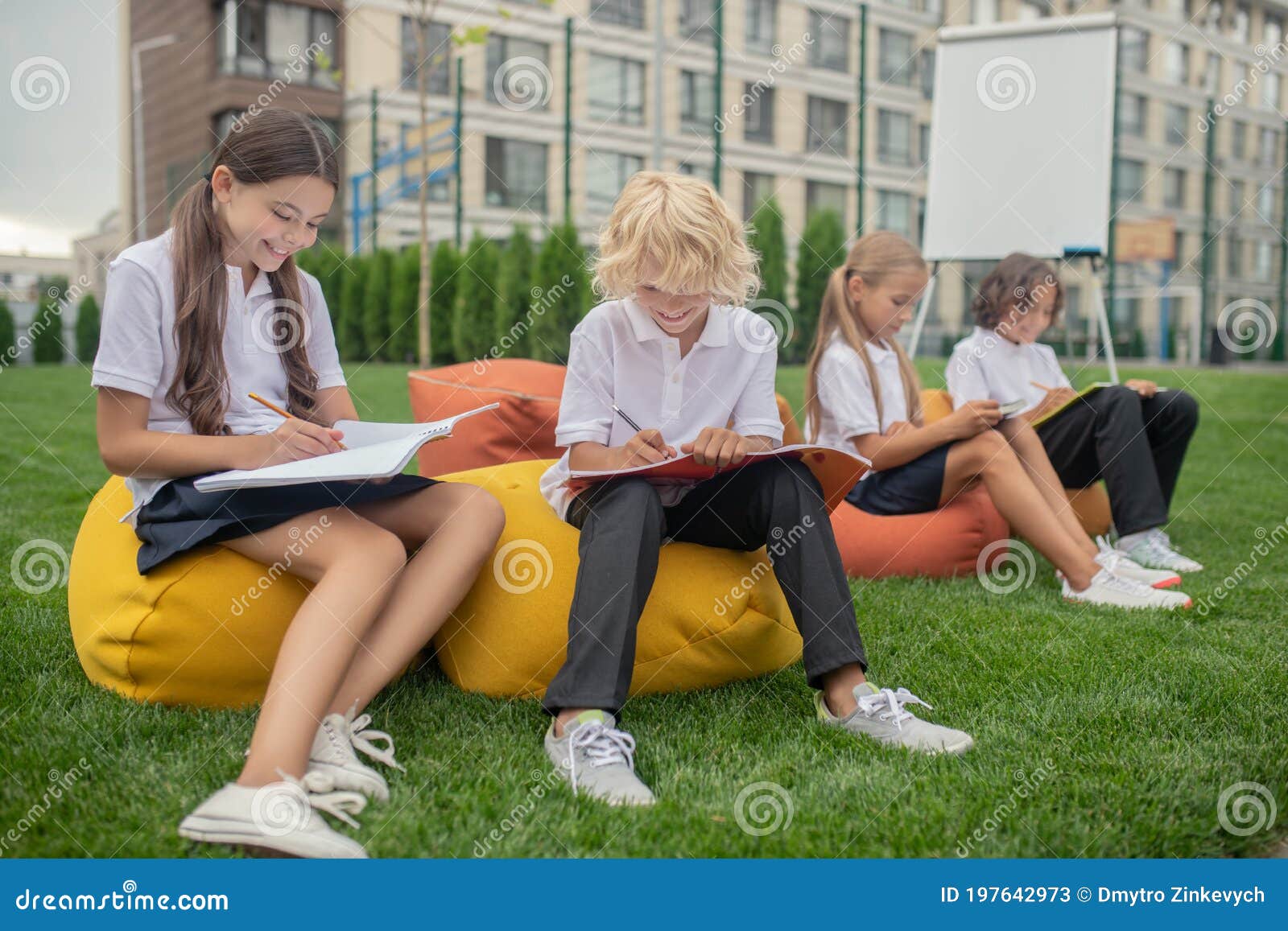 Two Children Work Together at the Lesson and Looking Busy Stock Image ...