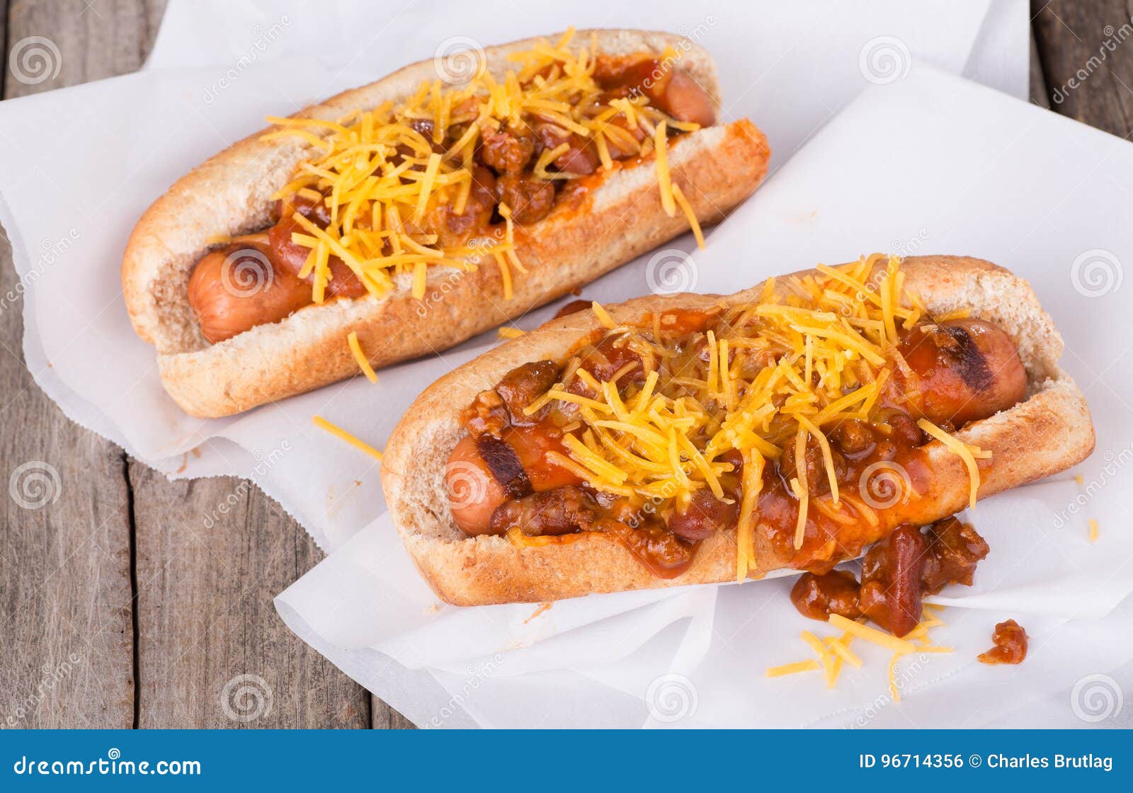 Two Chili Dogs stock photo. Image of hotdog, messy, lunch - 96714356