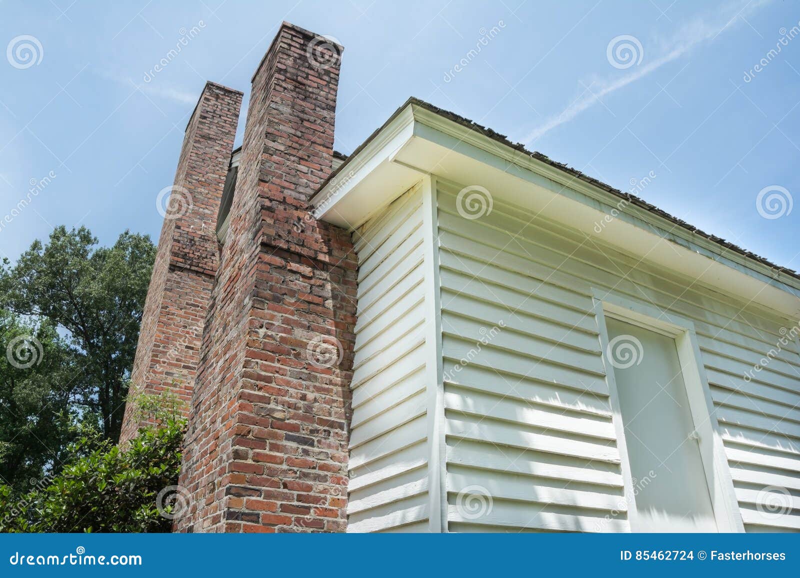 Two Chimneys. stock photo. Image of blue, brick, antebellum - 85462724