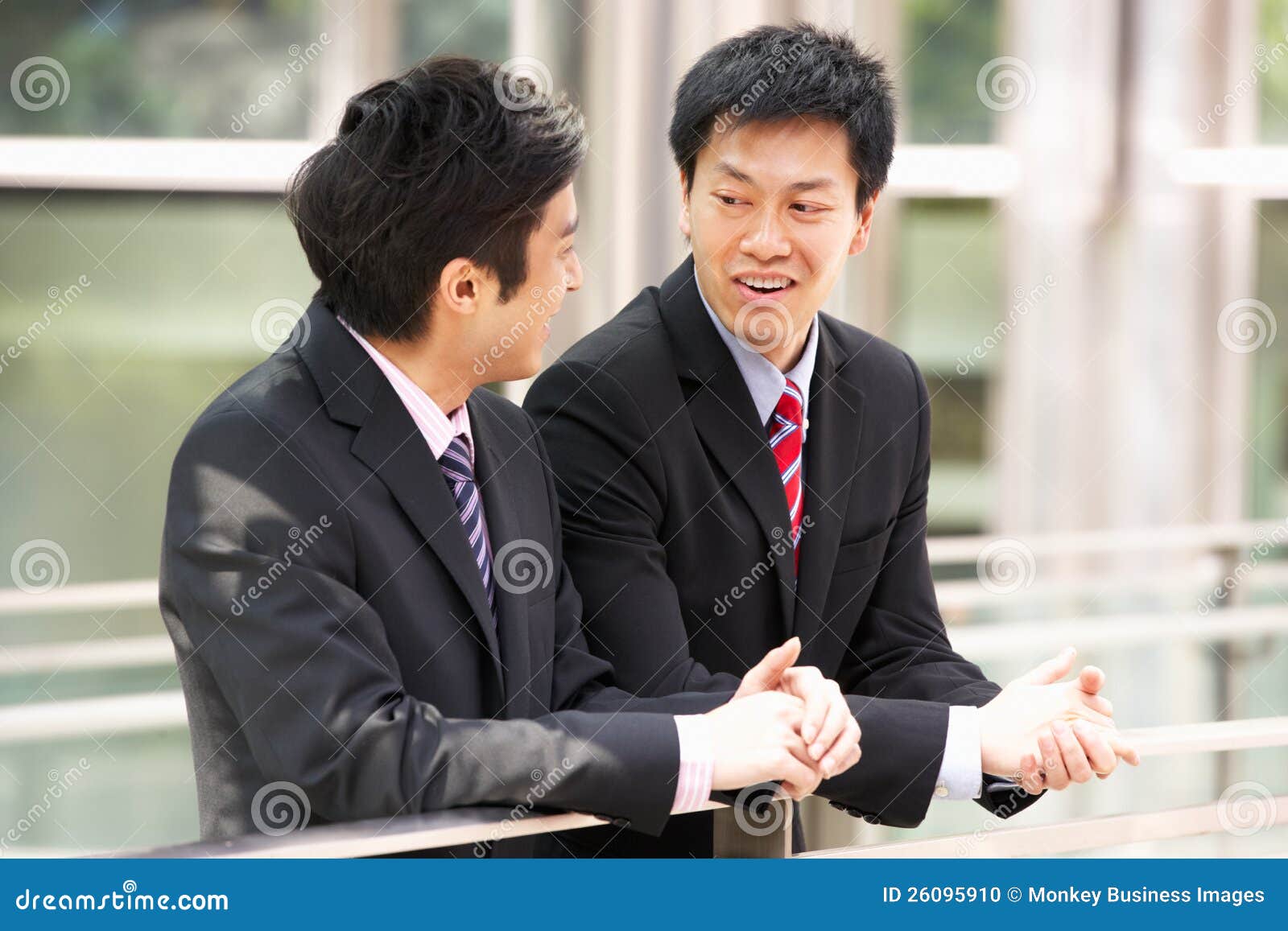 Two Chinese Businessmen Outside Modern Office Stock Photo - Image of ...