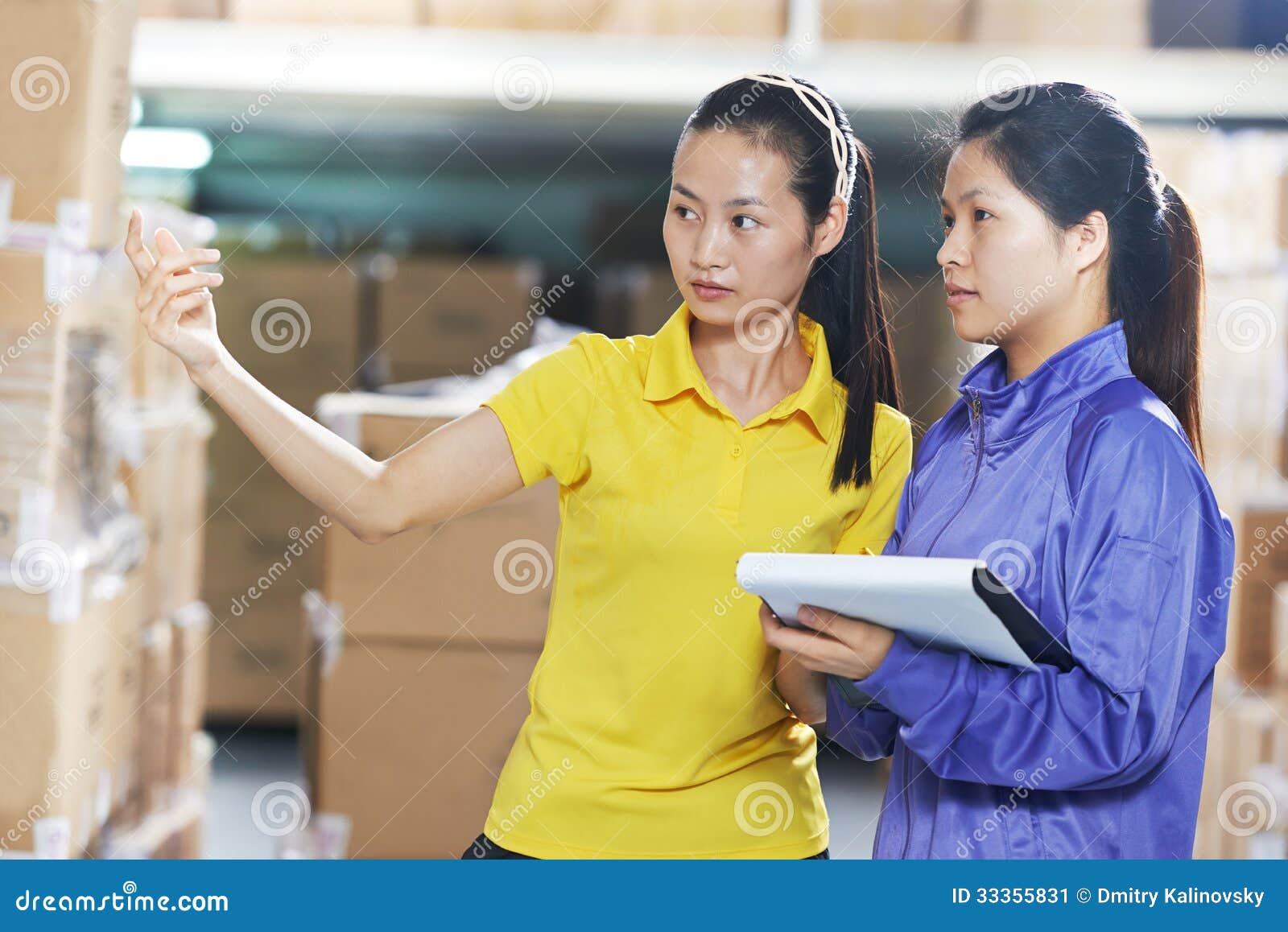 Two Chinese Female Workers in Warehouse Stock Image - Image of china ...