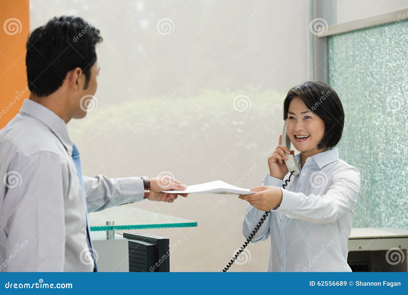 Two Chinese office workers stock image. Image of female - 62556689
