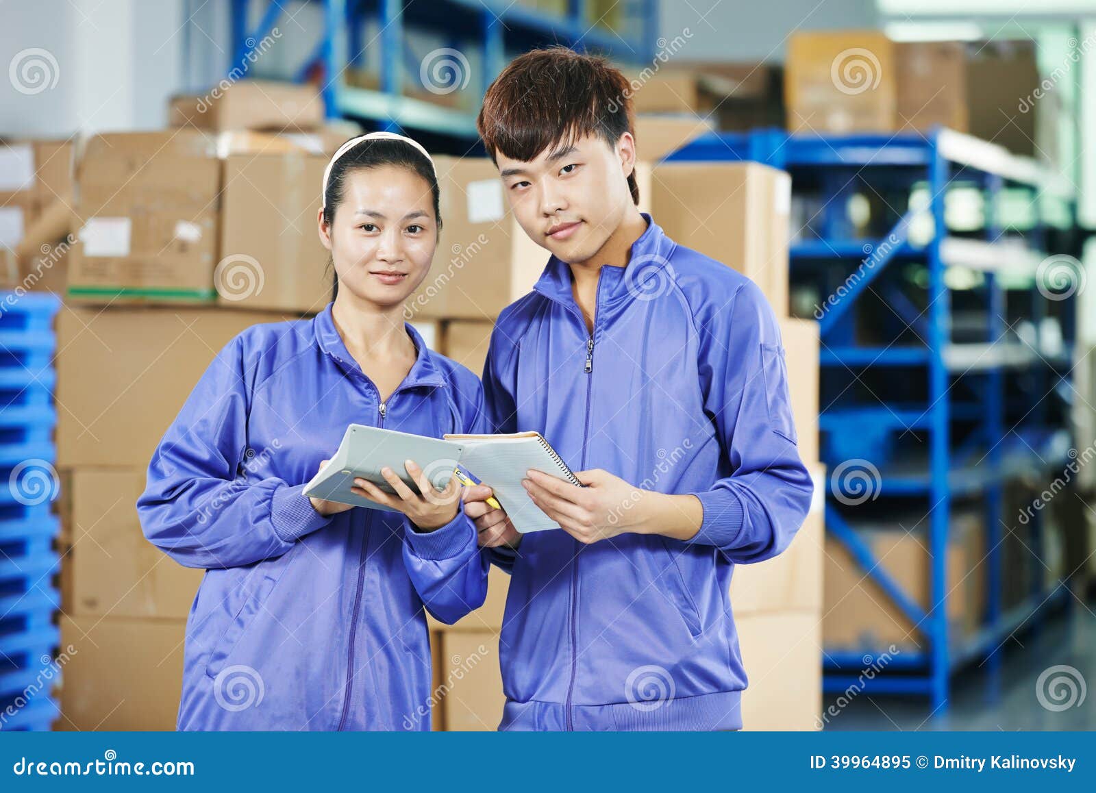 Two Chinese Workers in Warehouse Stock Image - Image of delivery ...