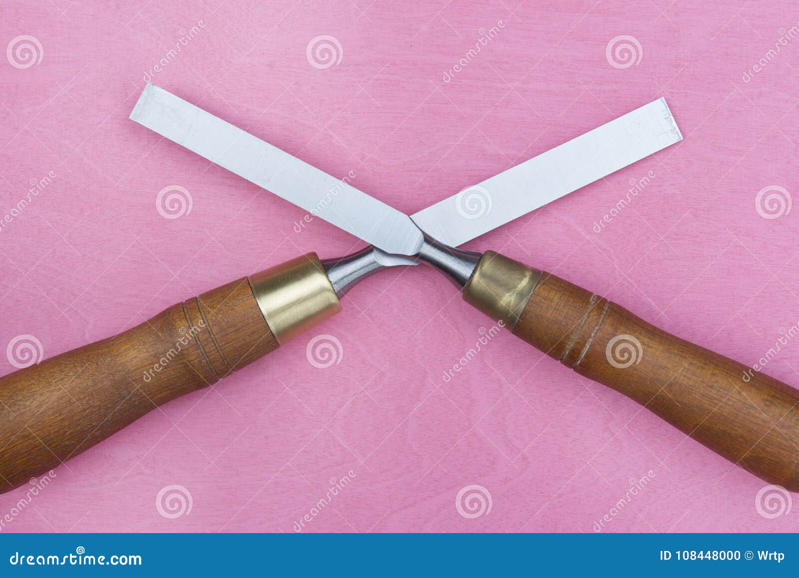 Two Chisels on a Pink Background Stock Photo - Image of splash, text ...