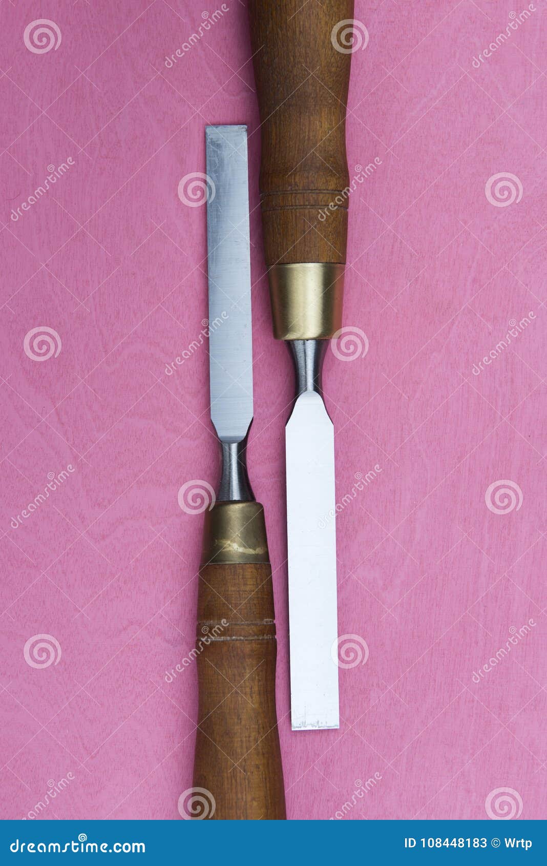Two Chisels on a Pink Background Stock Image - Image of visible, brown ...