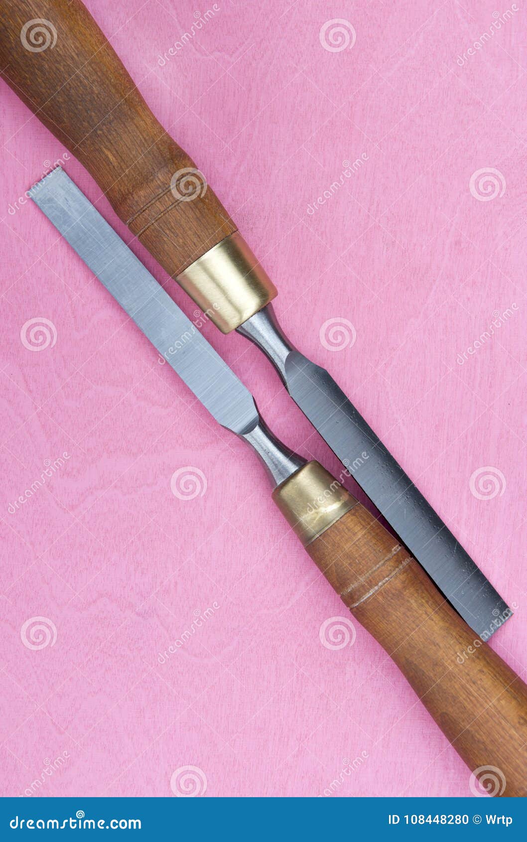 Two Chisels on a Pink Background Stock Photo - Image of pink, text ...