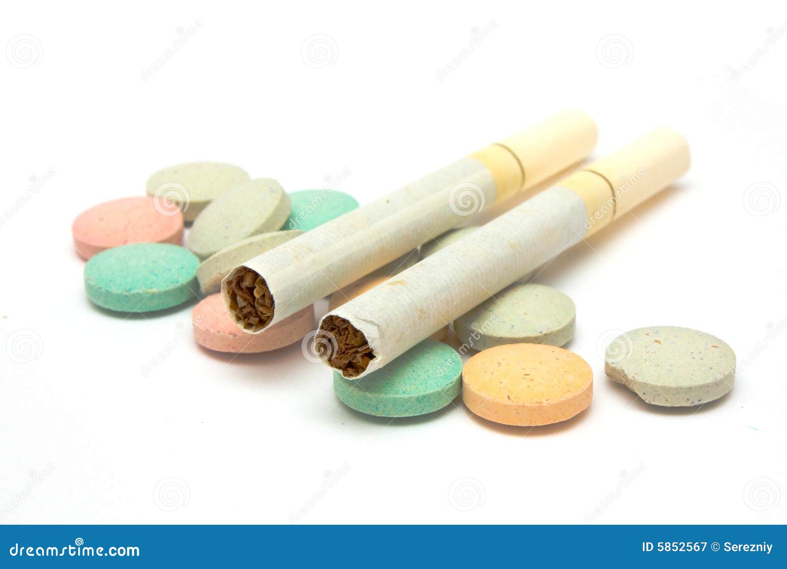 Two cigarette on few pills stock image. Image of help - 5852567