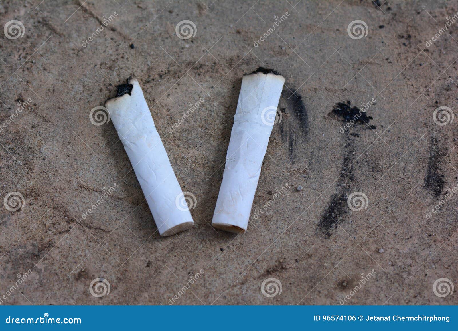 Two cigarette on the floor stock photo. Image of white - 96574106