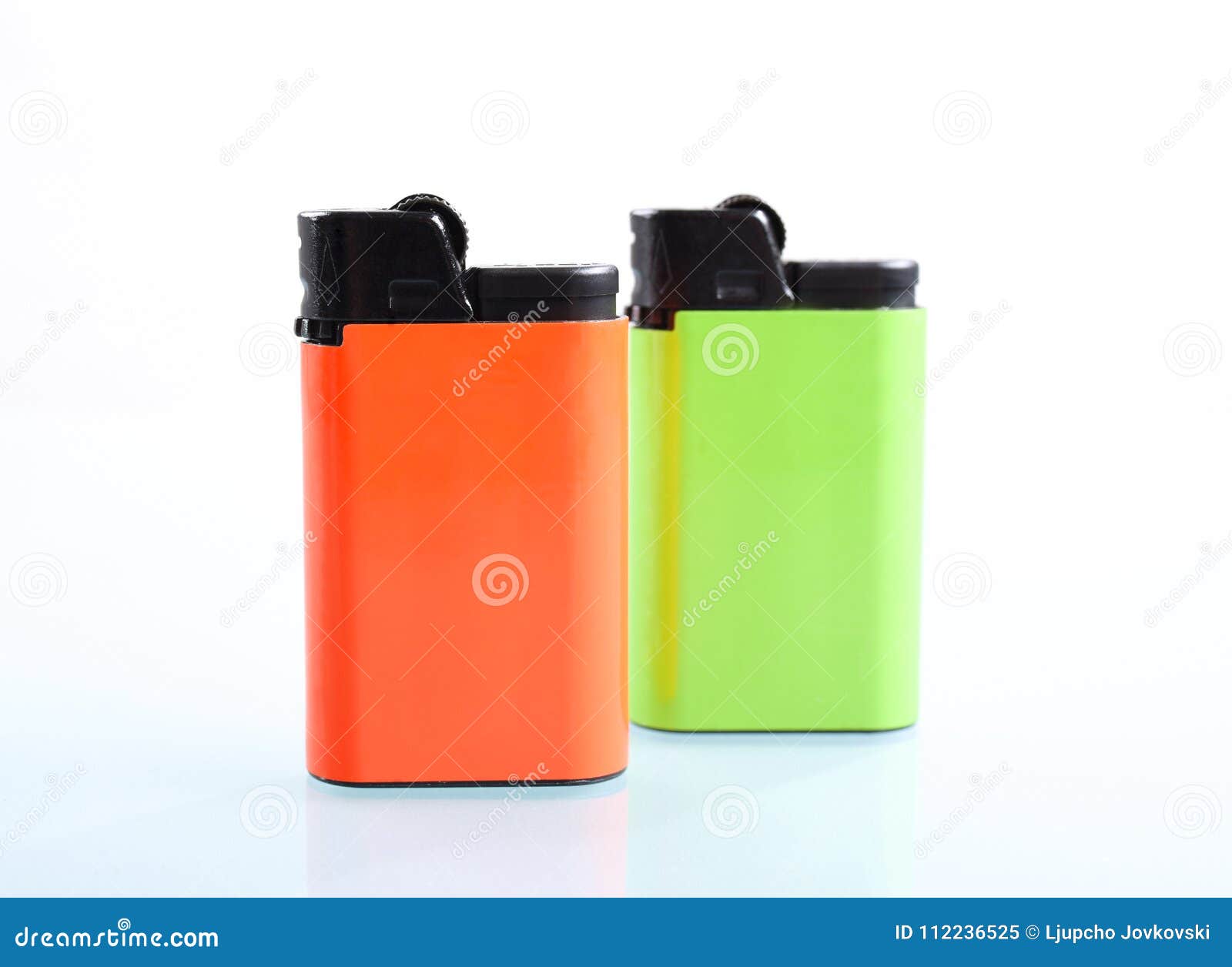 Two cigarette lighters stock image. Image of closeup - 112236525