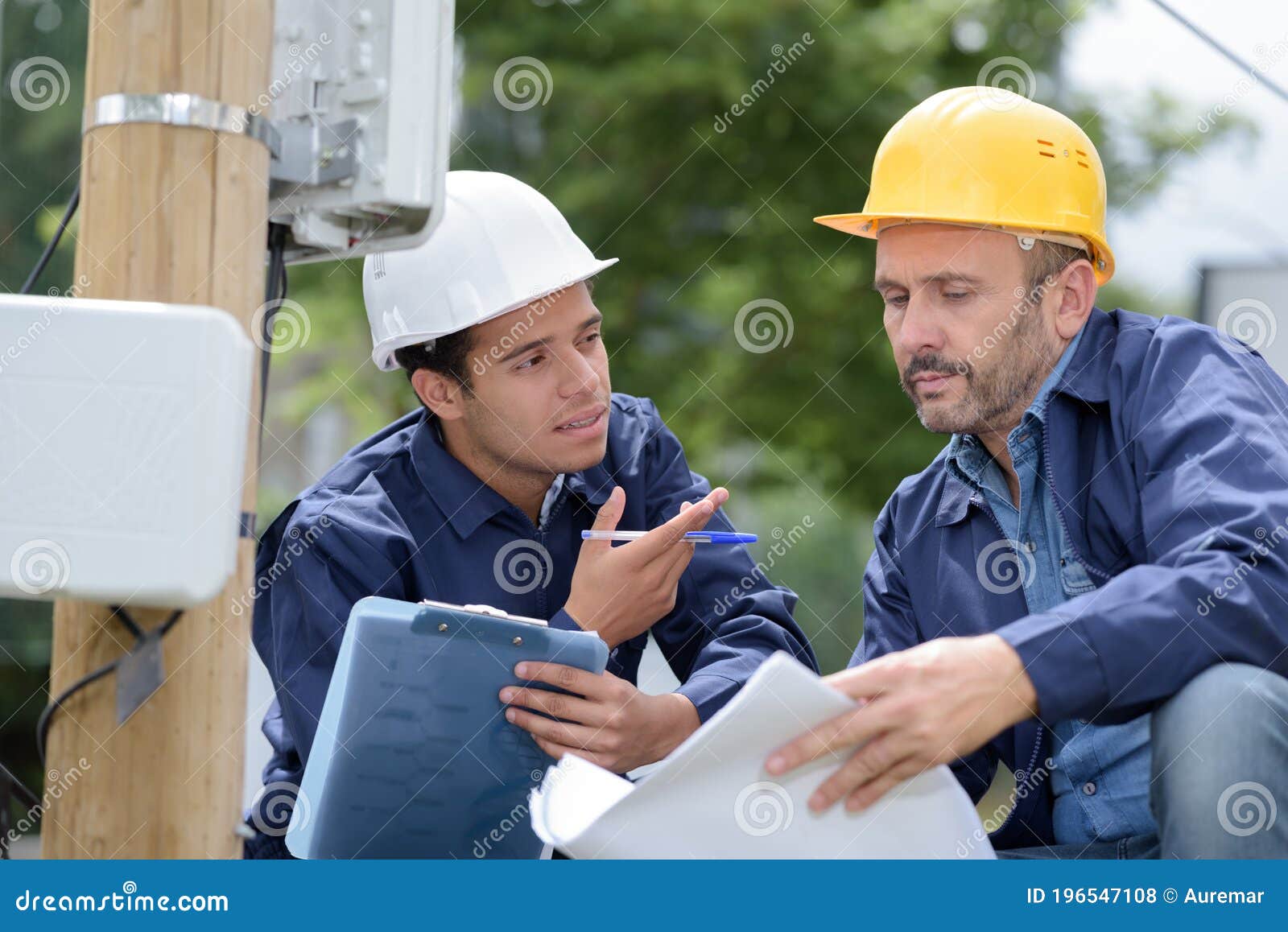 Two Civil Engineers Talking Stock Photo - Image of instructor ...