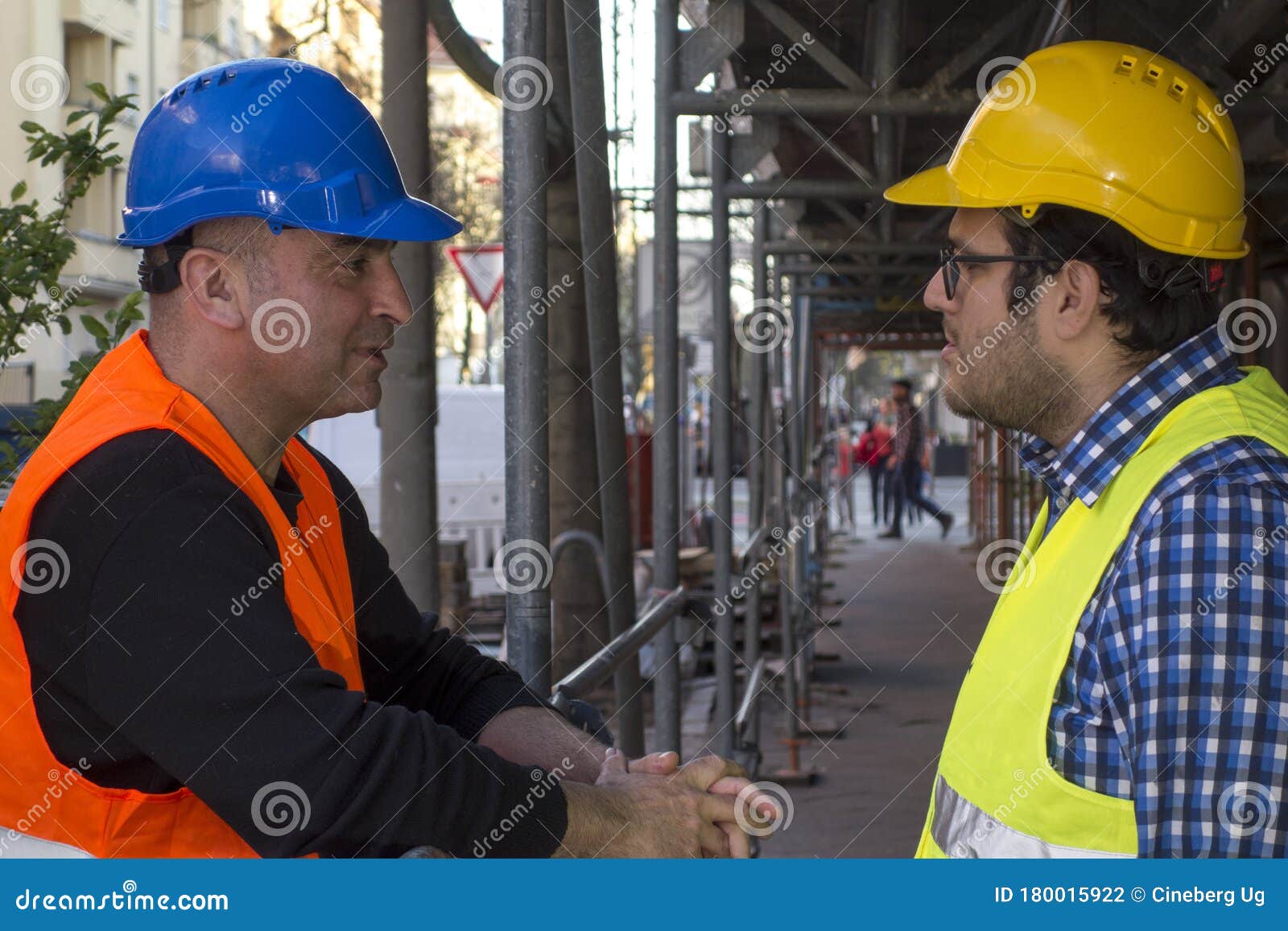 Two construction workers stock photo. Image of adult - 180015922