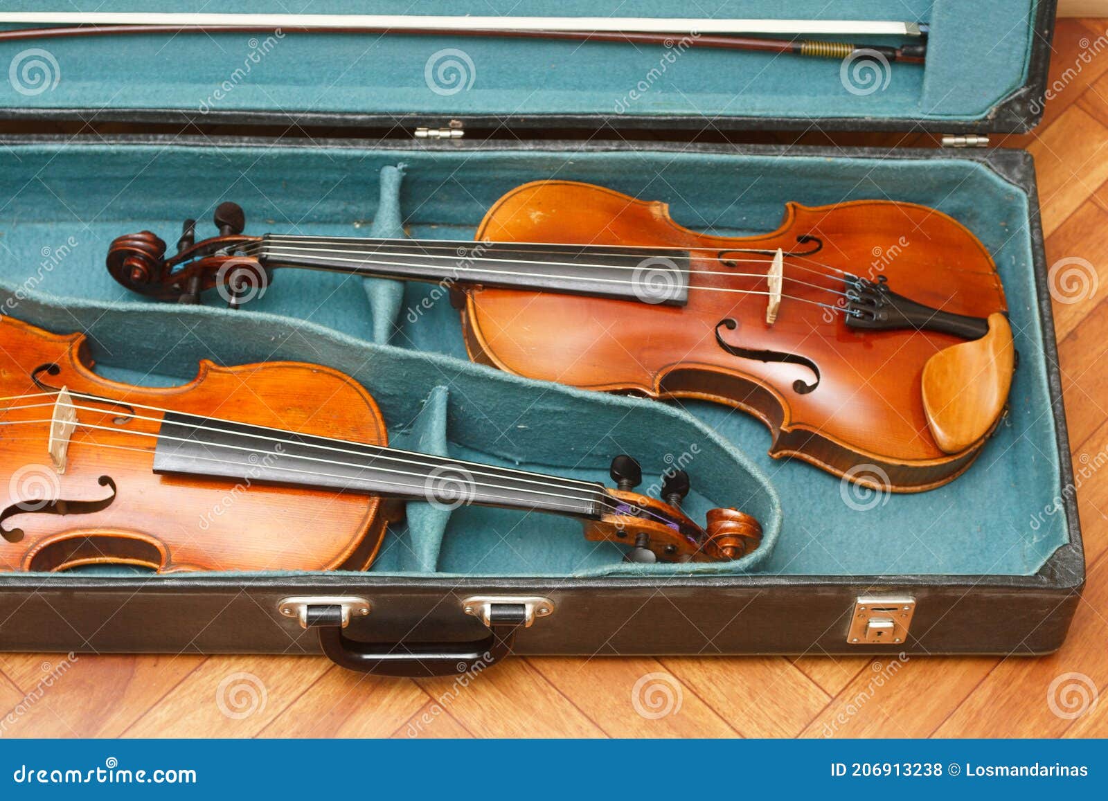 Two Classical Violins with Bows in a Double Case Stock Photo - Image of ...