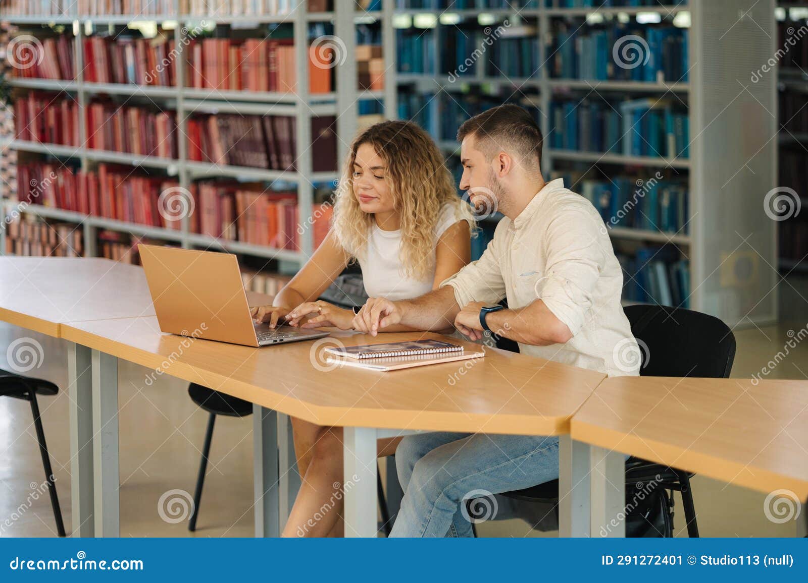 Two Classmate of Boy and Girl Study in College Library. Girl Using ...