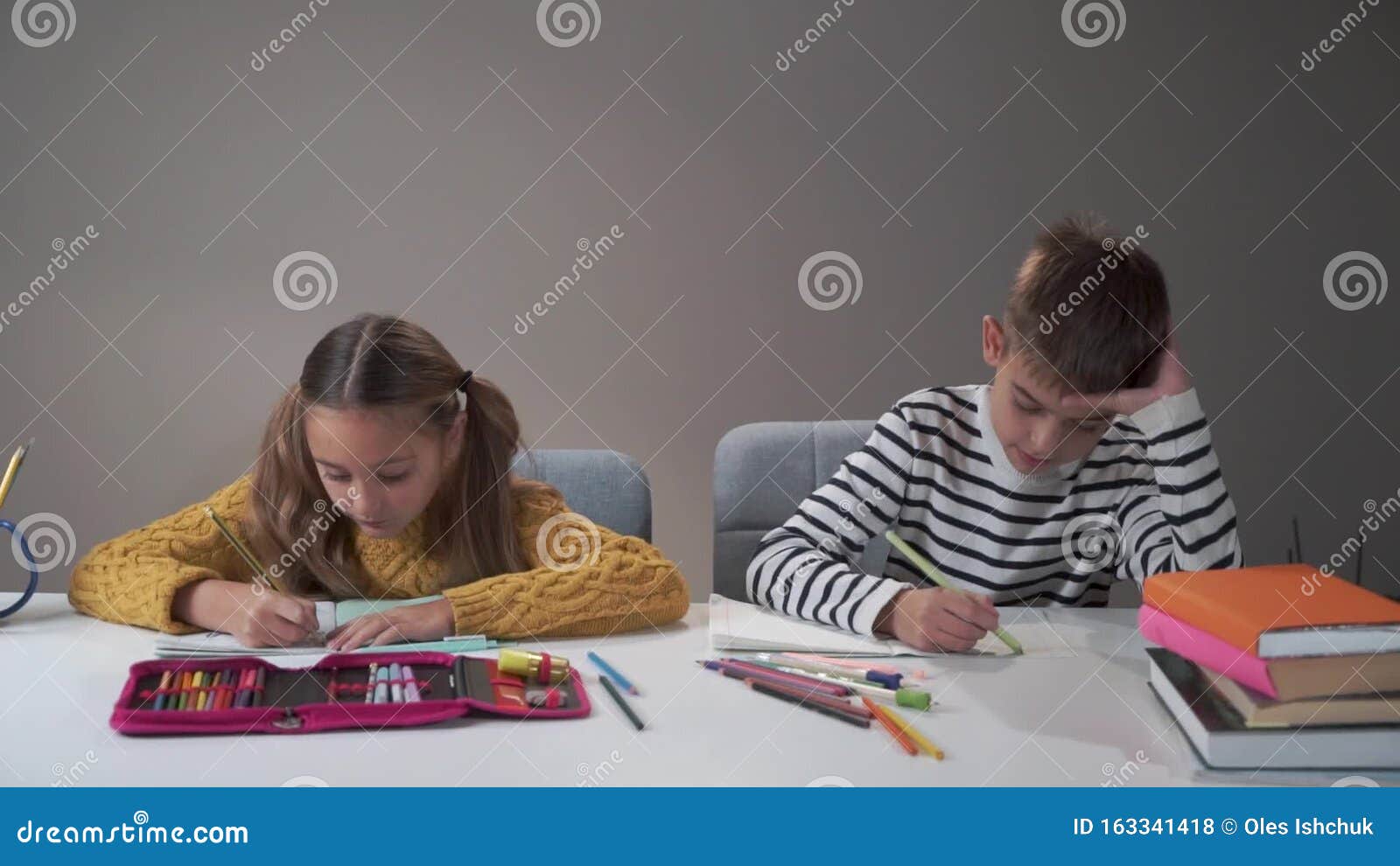 Two Classmates Studying at School. Tired Bored Boy Banging Head Against ...