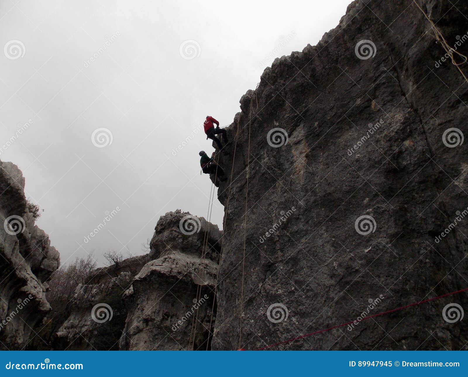 Two Climber Rappelling on the Top of a Cliff in Lebanon Editorial Image ...