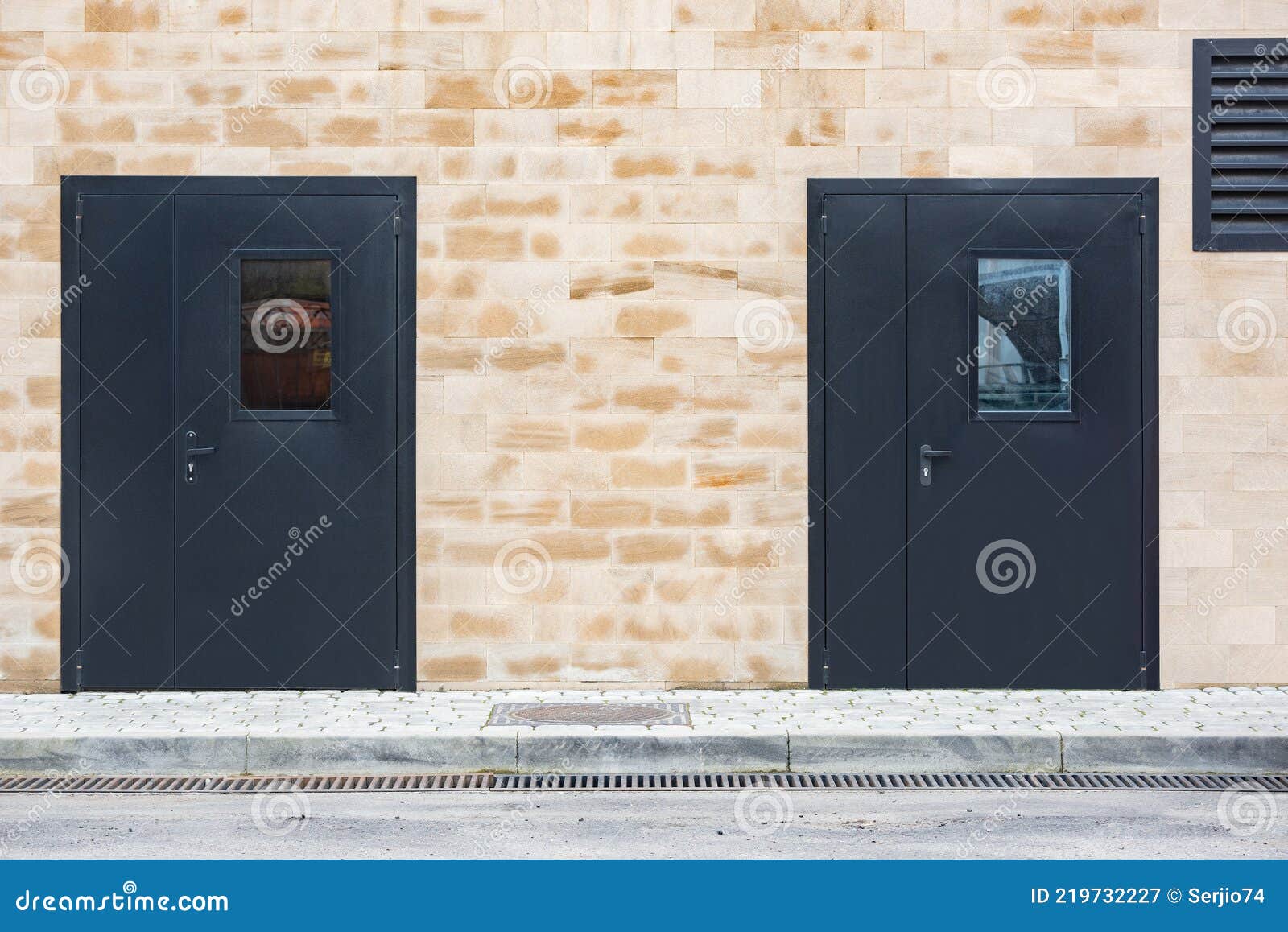 Two closed metal doors. stock image. Image of floor - 219732227