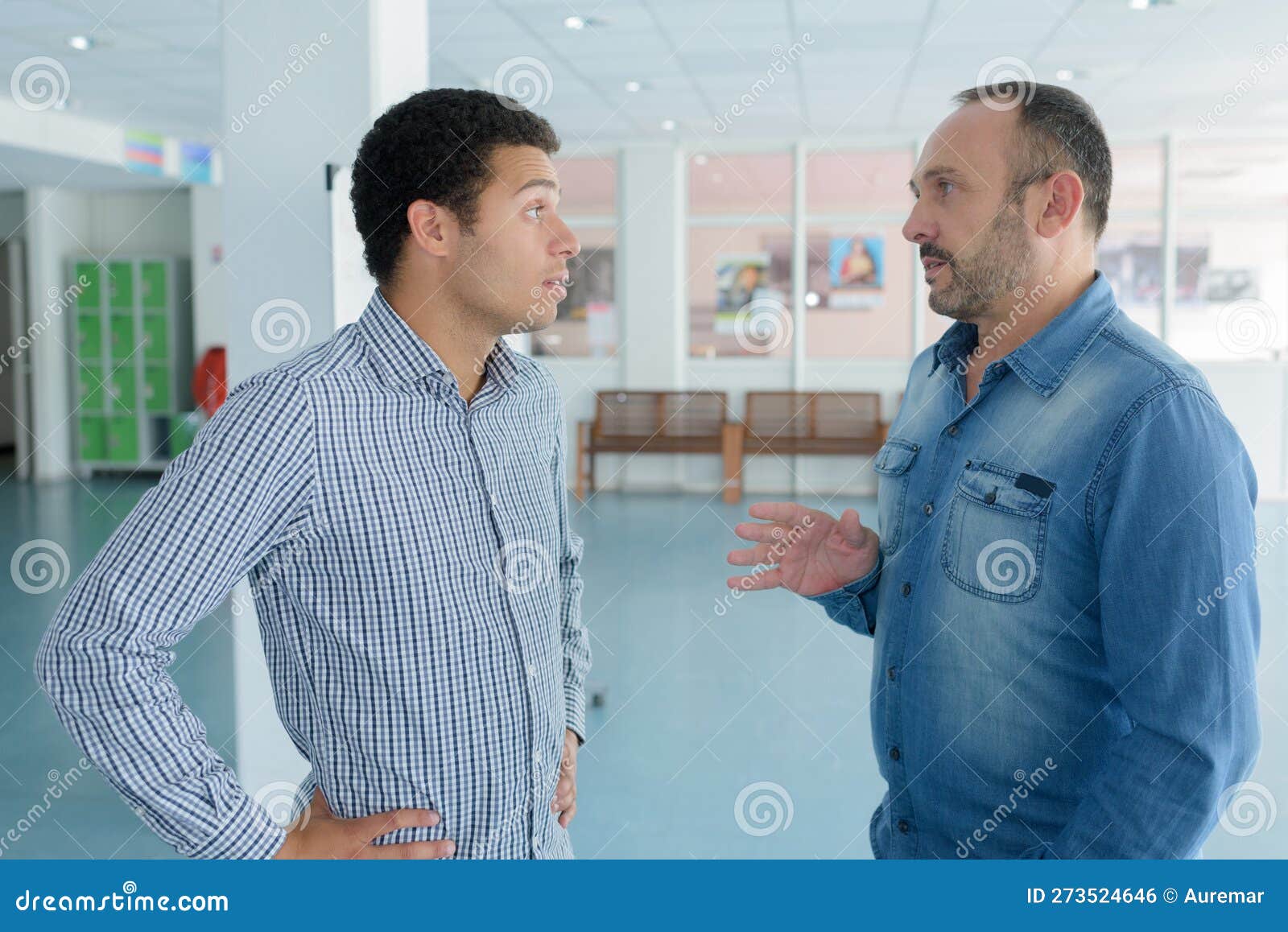 Two Co-workers Talking Indoors Stock Photo - Image of management ...
