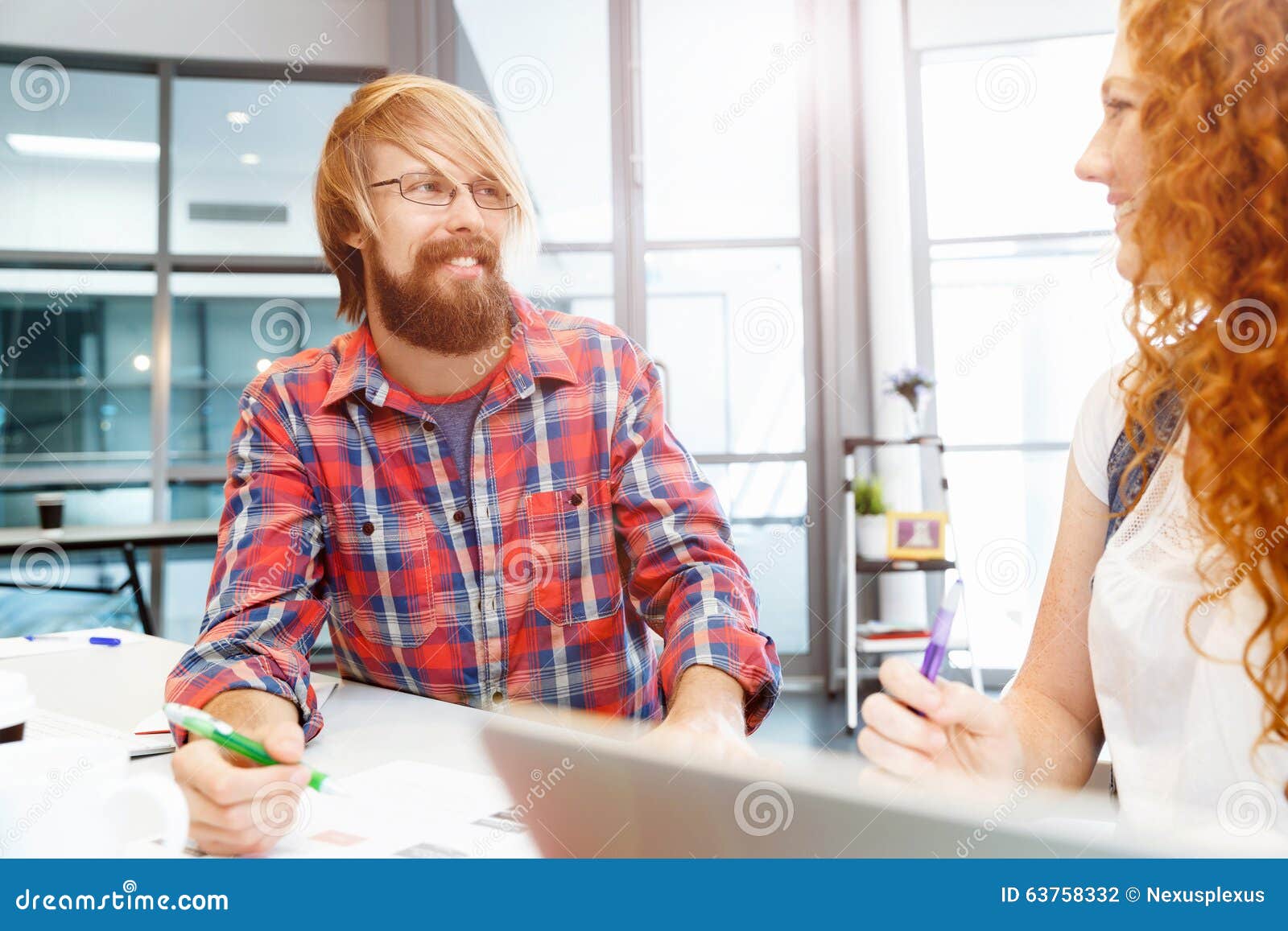 Two Co-workers Working Together Stock Photo - Image of designer ...