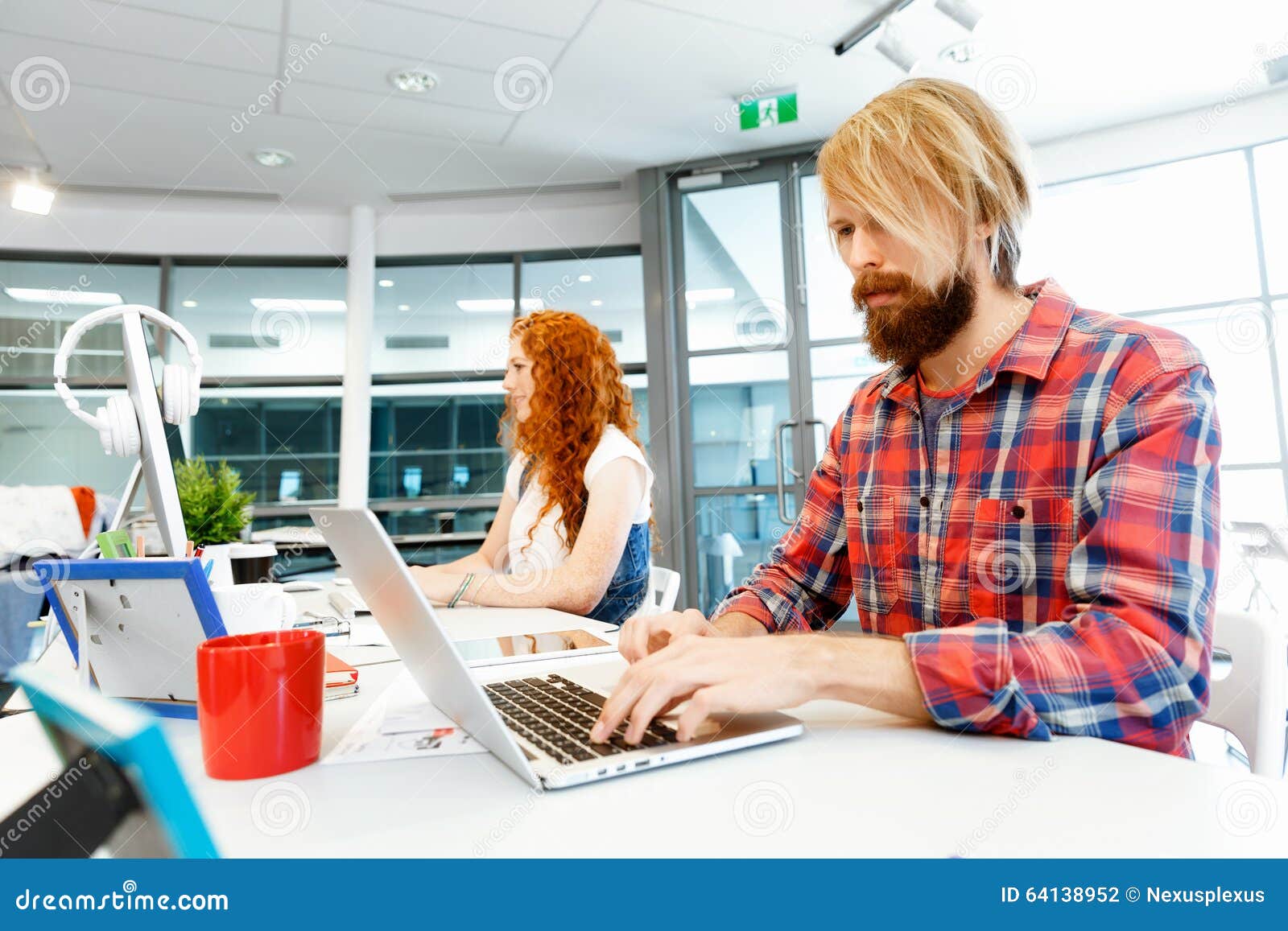 Two Co-workers Working Together Stock Photo - Image of office ...