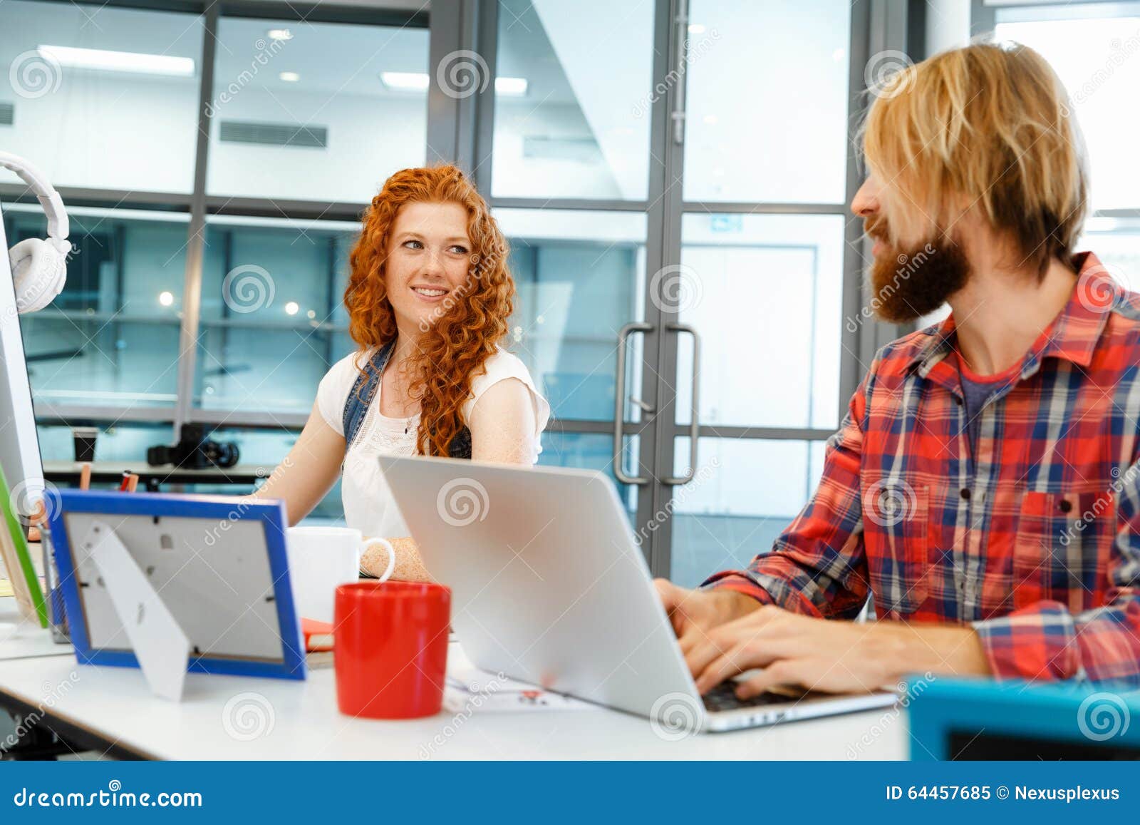 Two Co-workers Working Together Stock Image - Image of designer ...