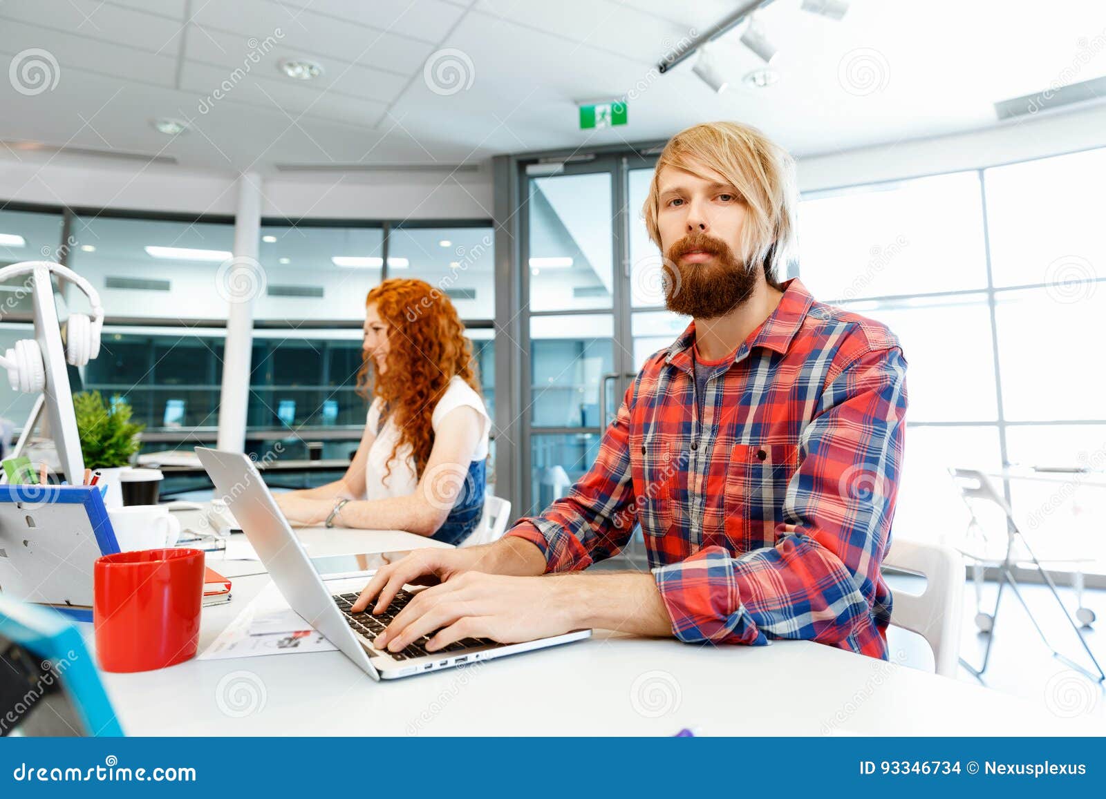 Two Co-workers Working Together Stock Photo - Image of team, computer ...