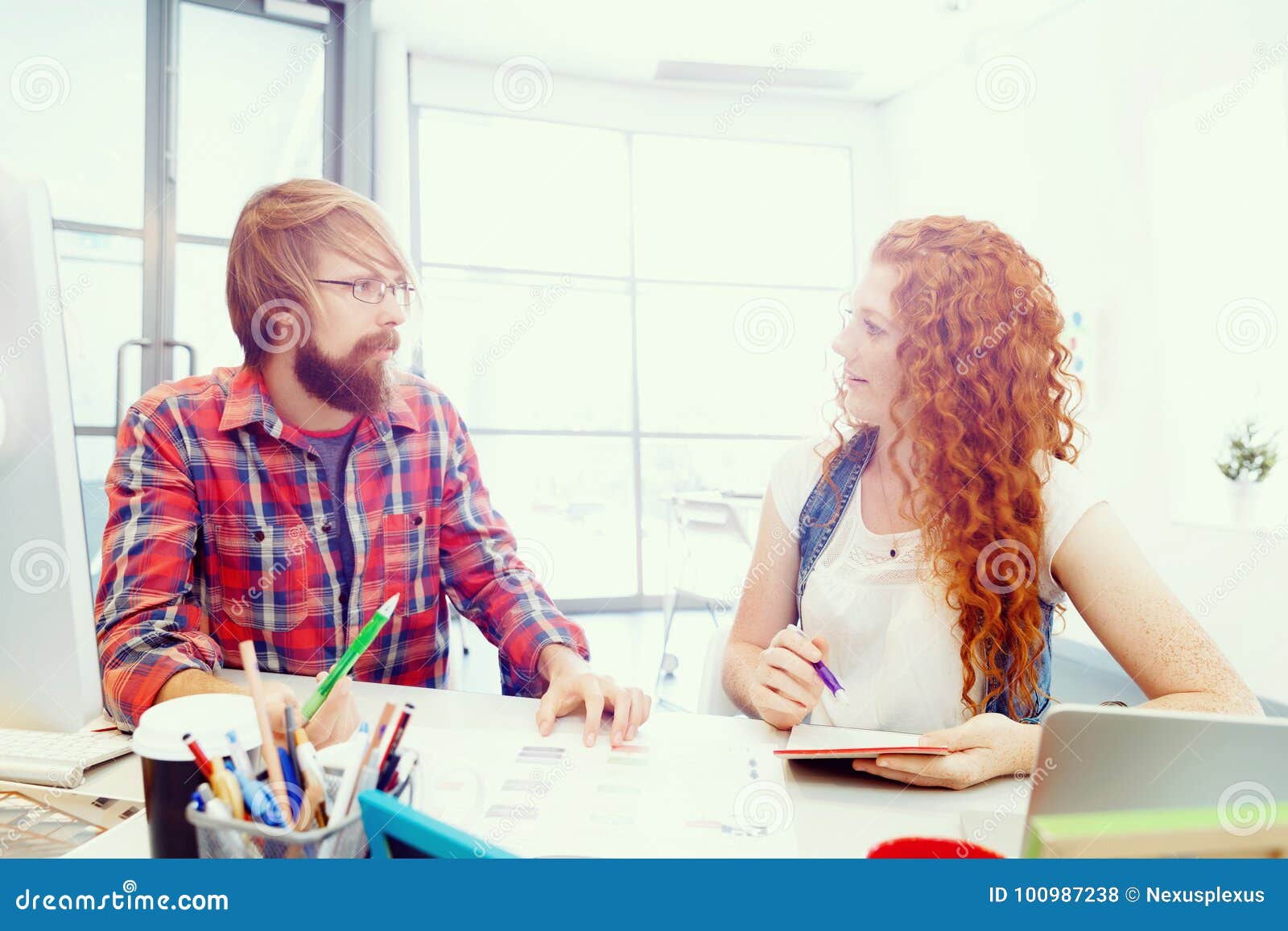 Two Co-workers Working Together Stock Photo - Image of team, coworkers ...
