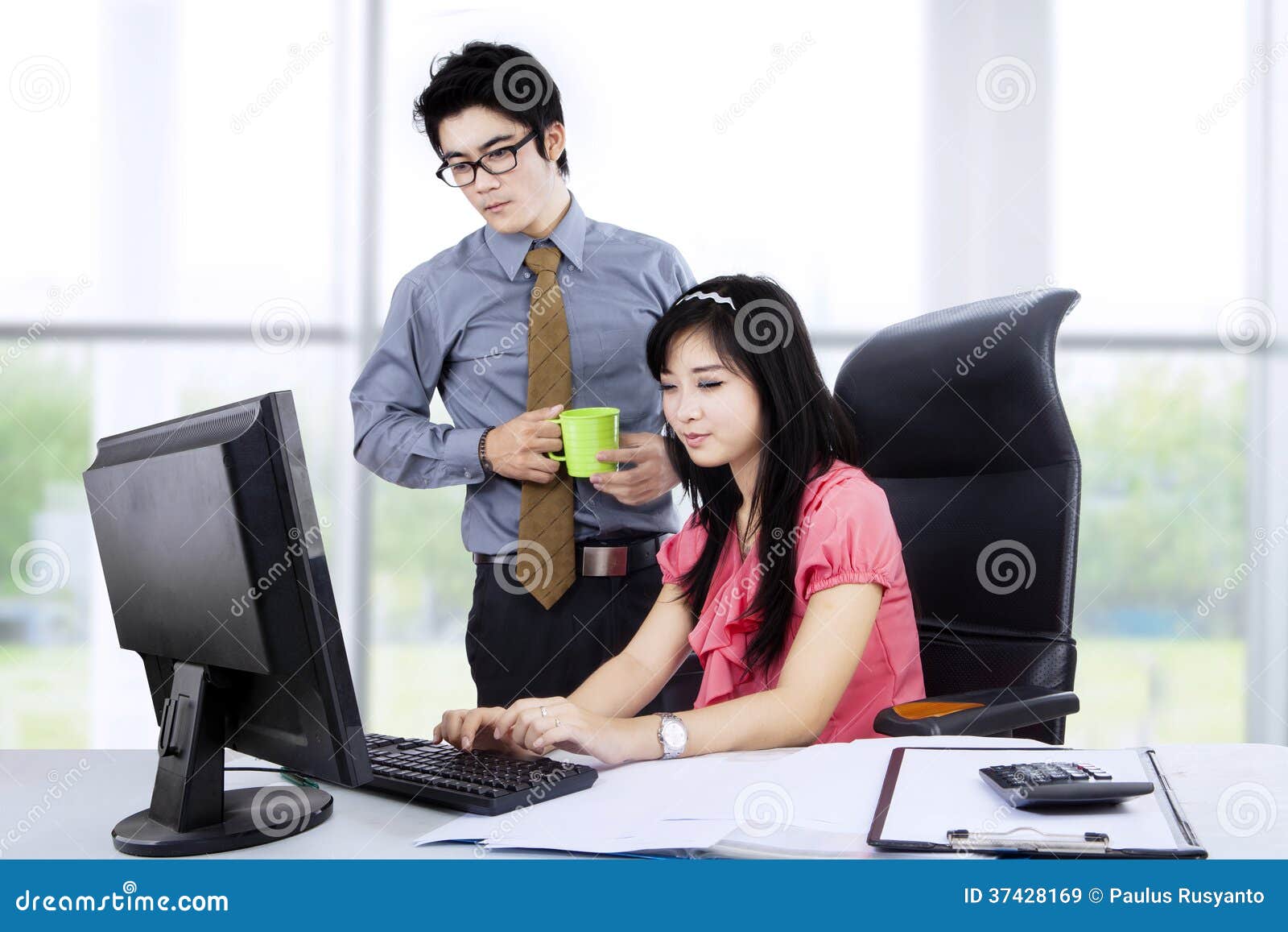 Two Co-workers Working Together Stock Image - Image of business, coffee ...