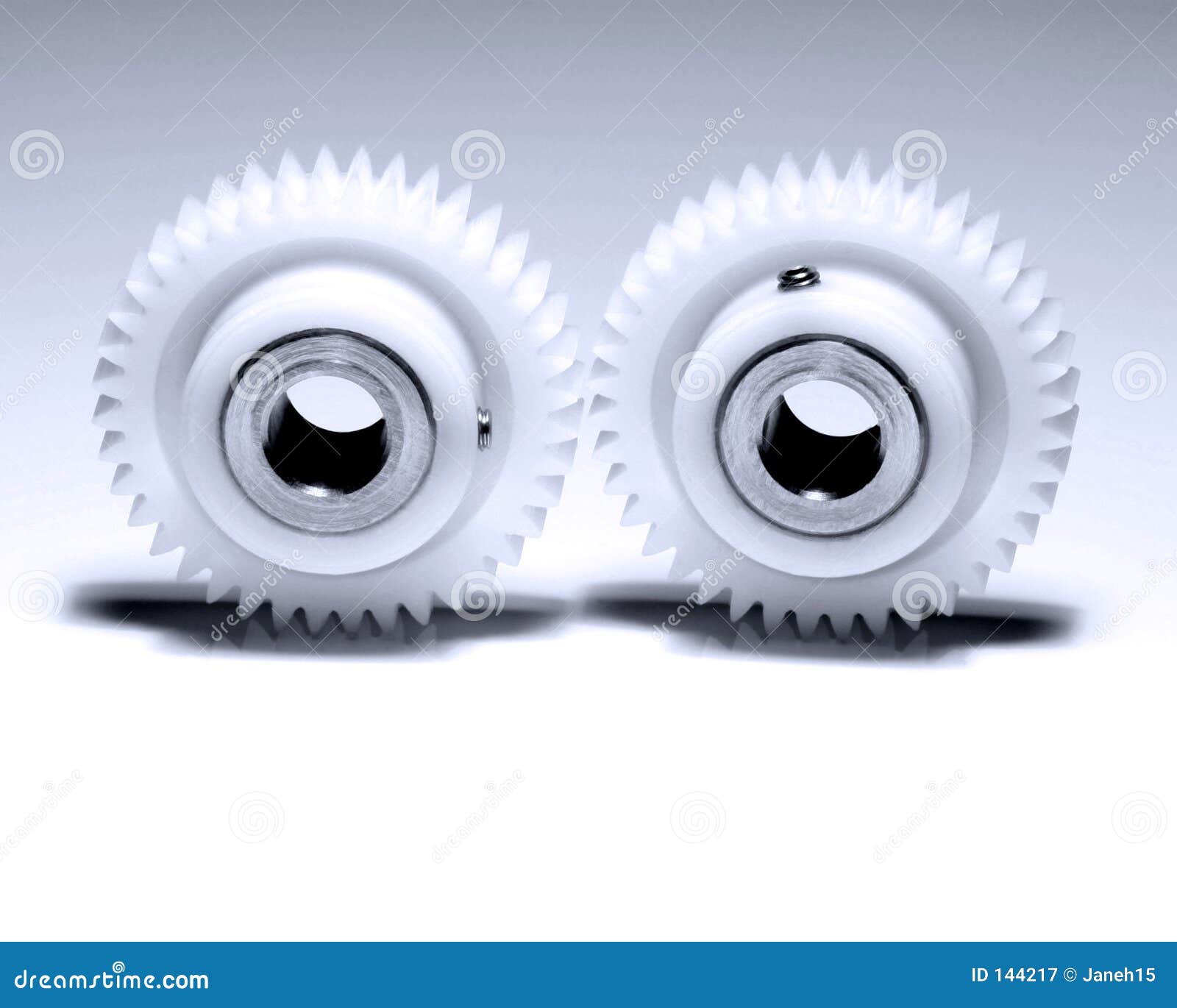 Two cogwheels on white stock image. Image of mechinery - 144217