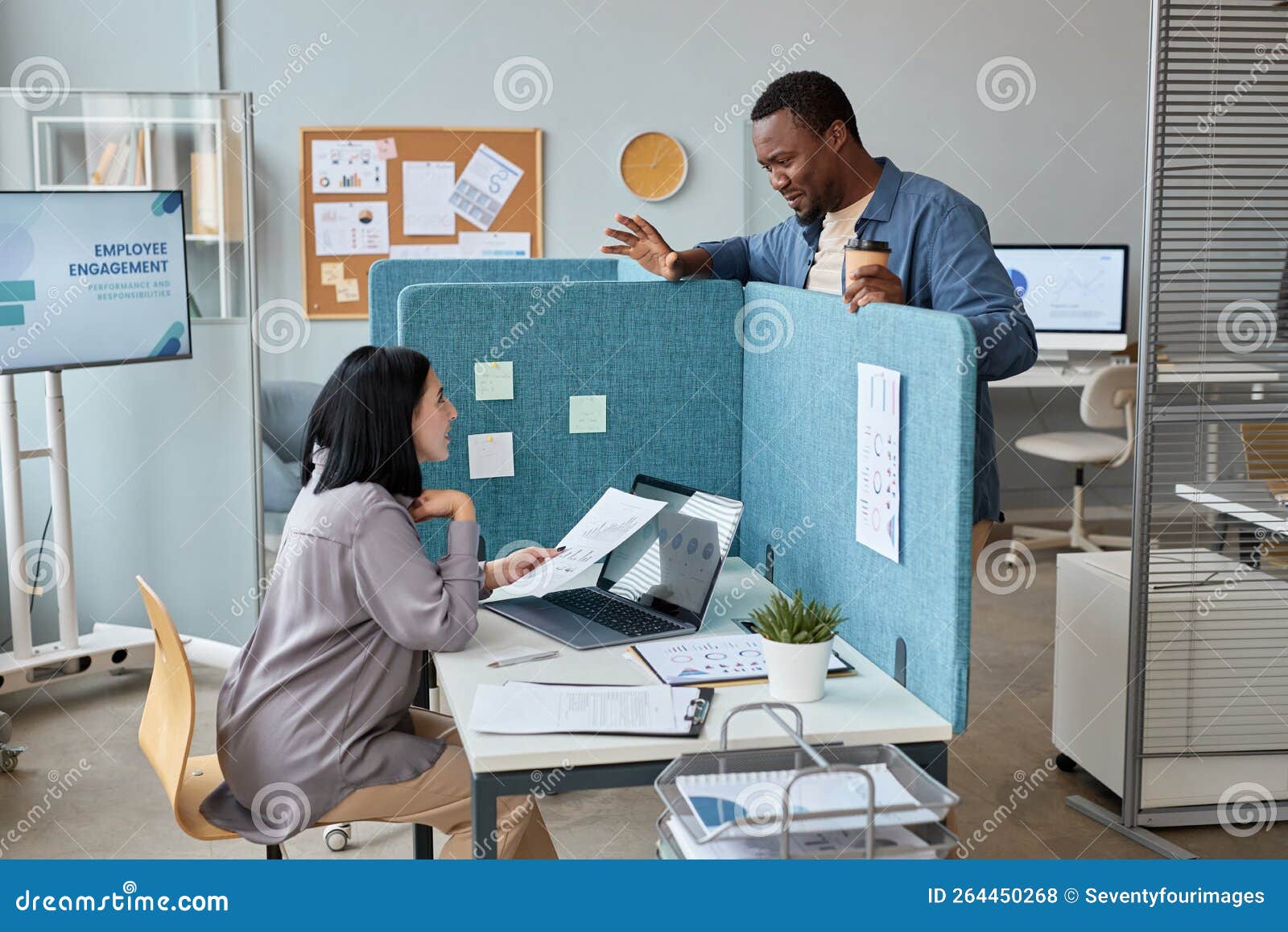 Two Colleagues Chatting in Office Over Partition Wall Stock Photo ...