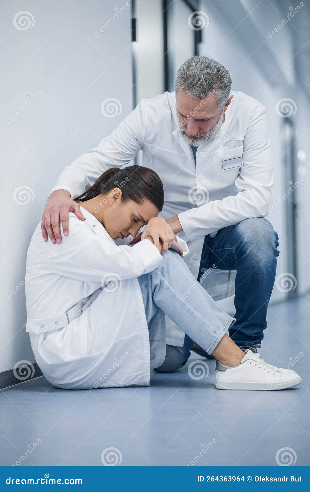 Two Colleagues in the Clinic Corridor Afetr a Hard Shift Stock Photo ...
