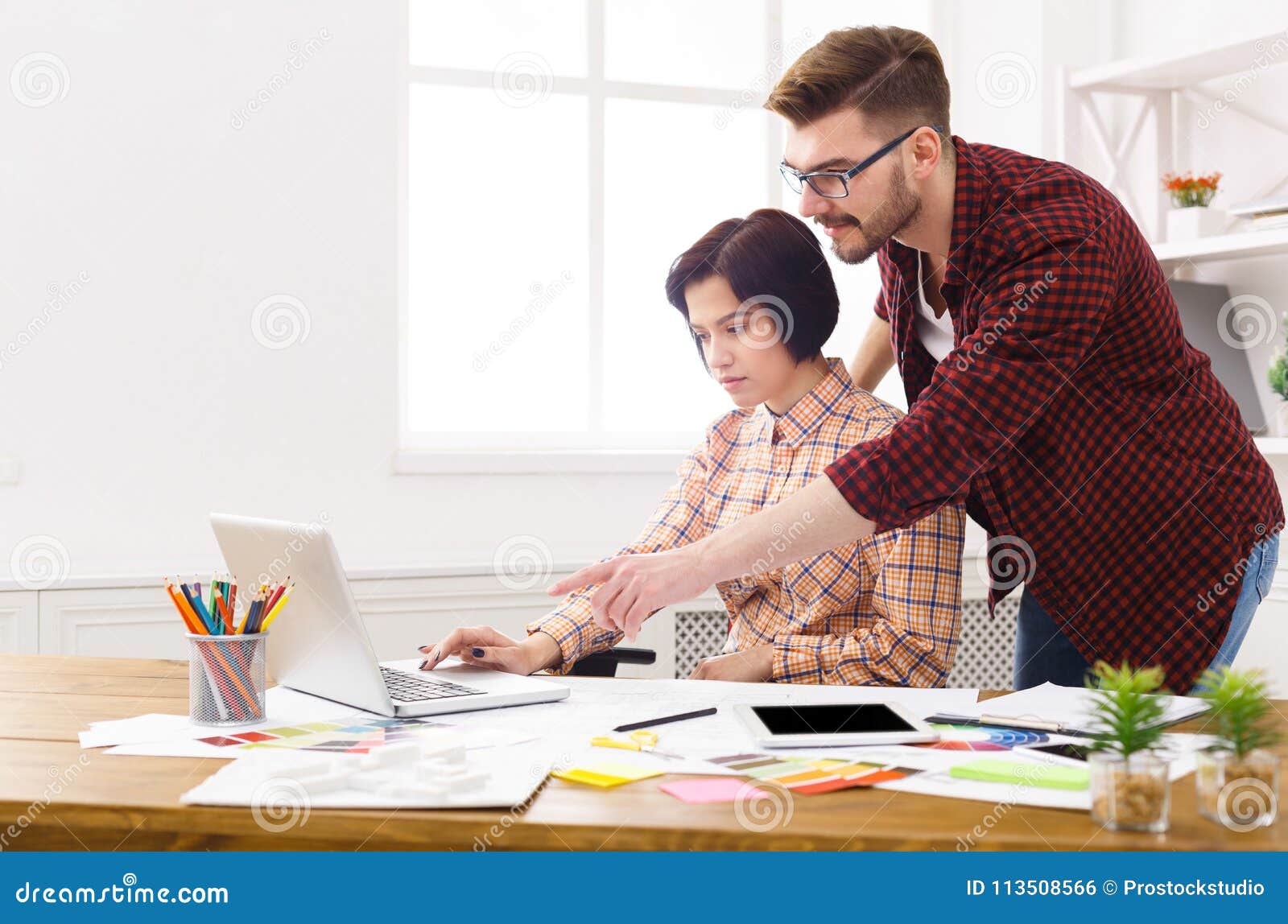 Two Colleagues Discussing Architectural Project Stock Photo - Image of ...