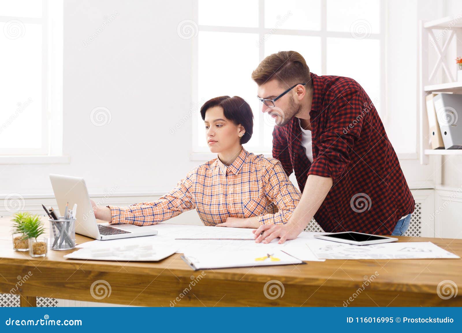Two Colleagues Discussing Architectural Project Stock Image - Image of ...